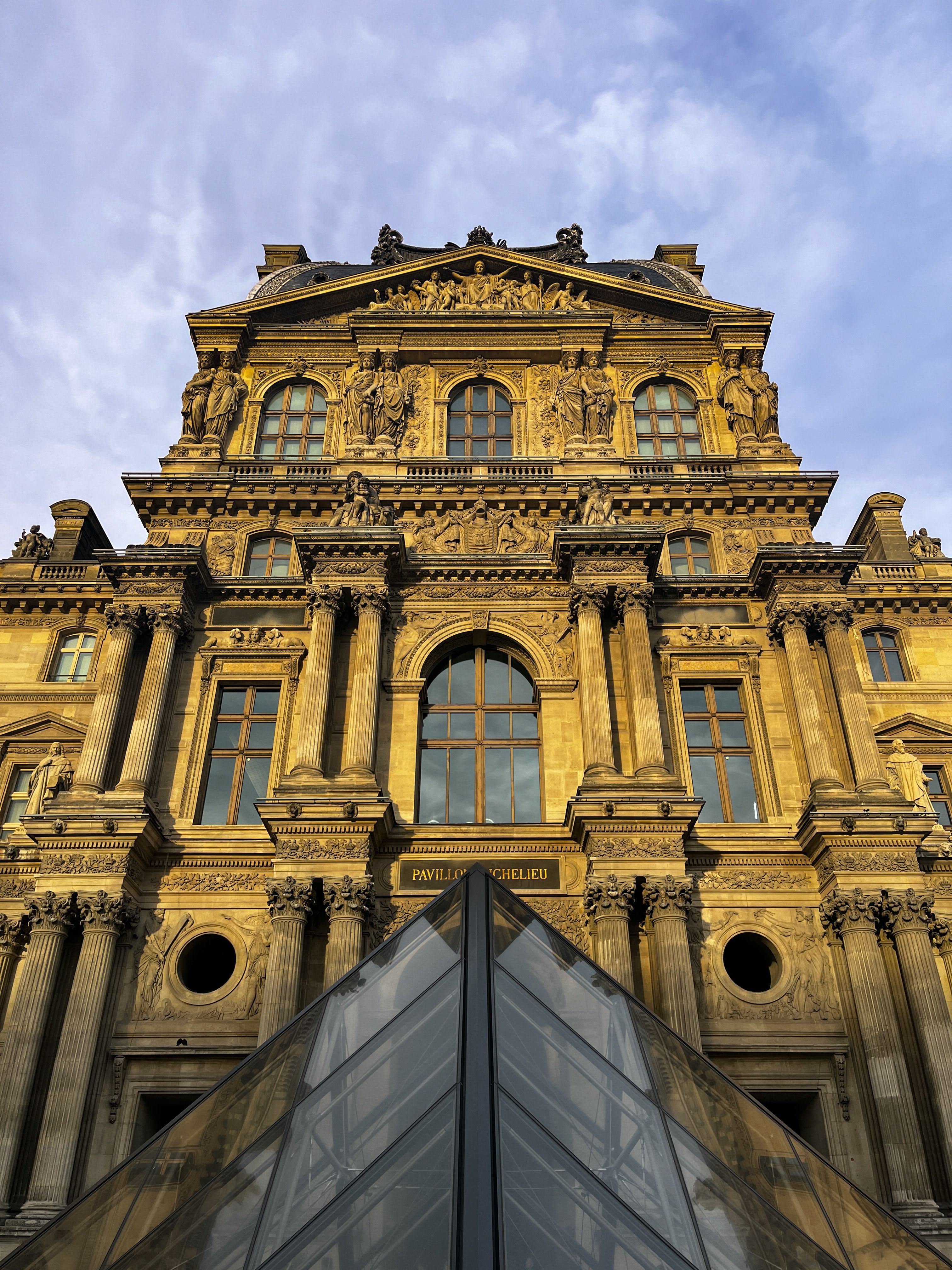 Majestic Louvre Museum Pavilion in Golden Light · Free Stock Photo