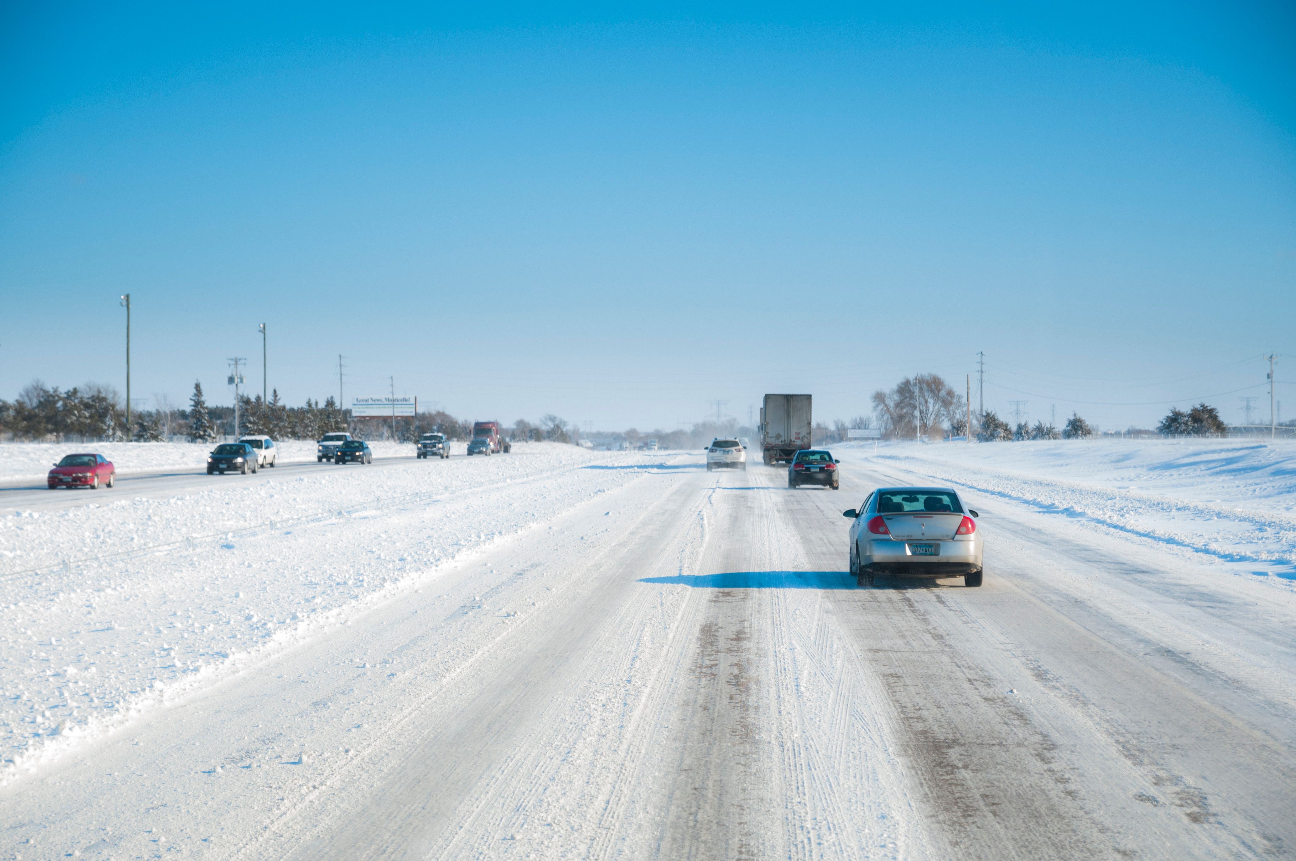 Winter Highway with Icy Road Conditions · Free Stock Photo