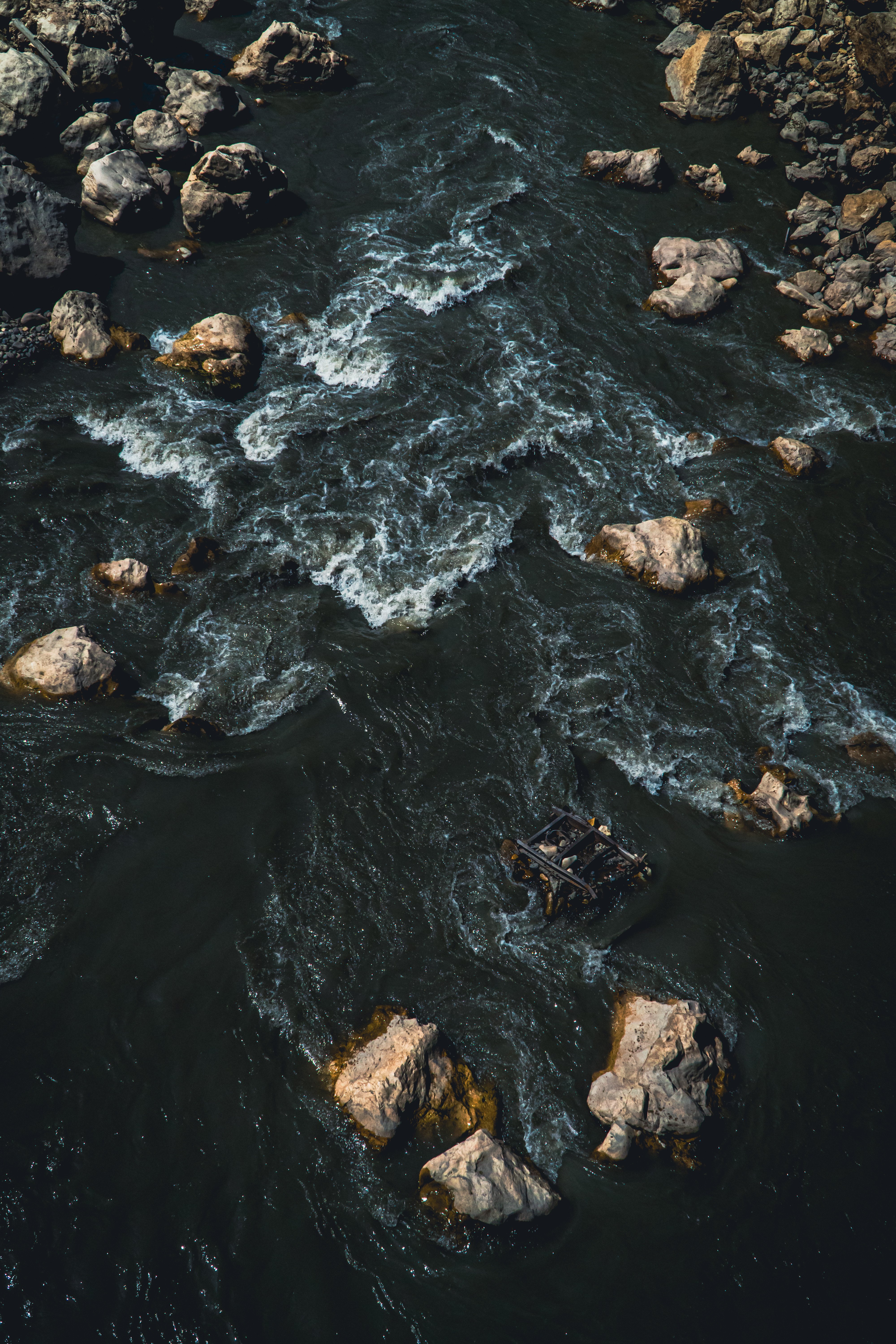 Aerial View of River with Rocky Outcrops and Rapids · Free Stock Photo