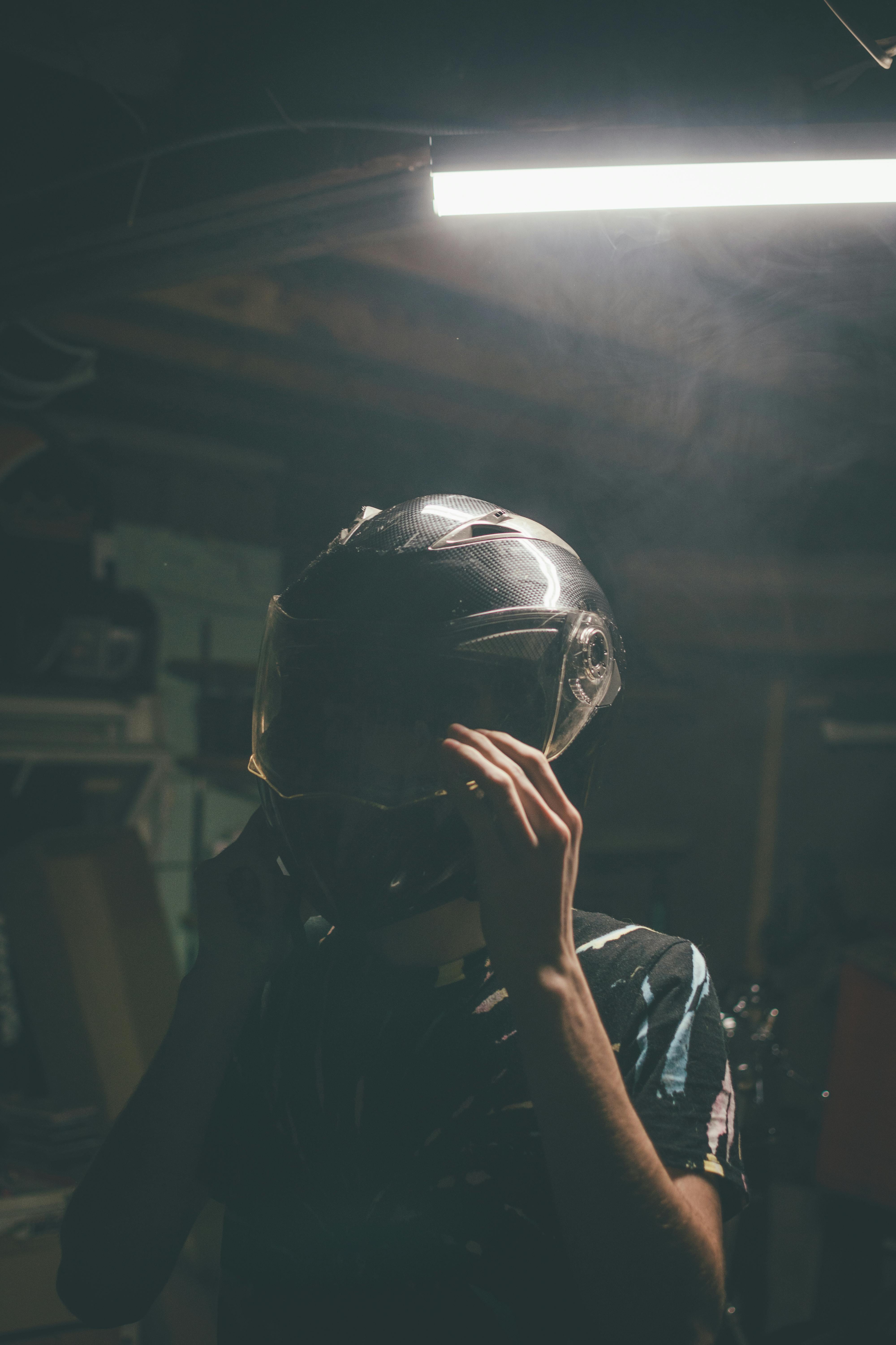 Person Wearing Motorcycle Helmet · Free Stock Photo