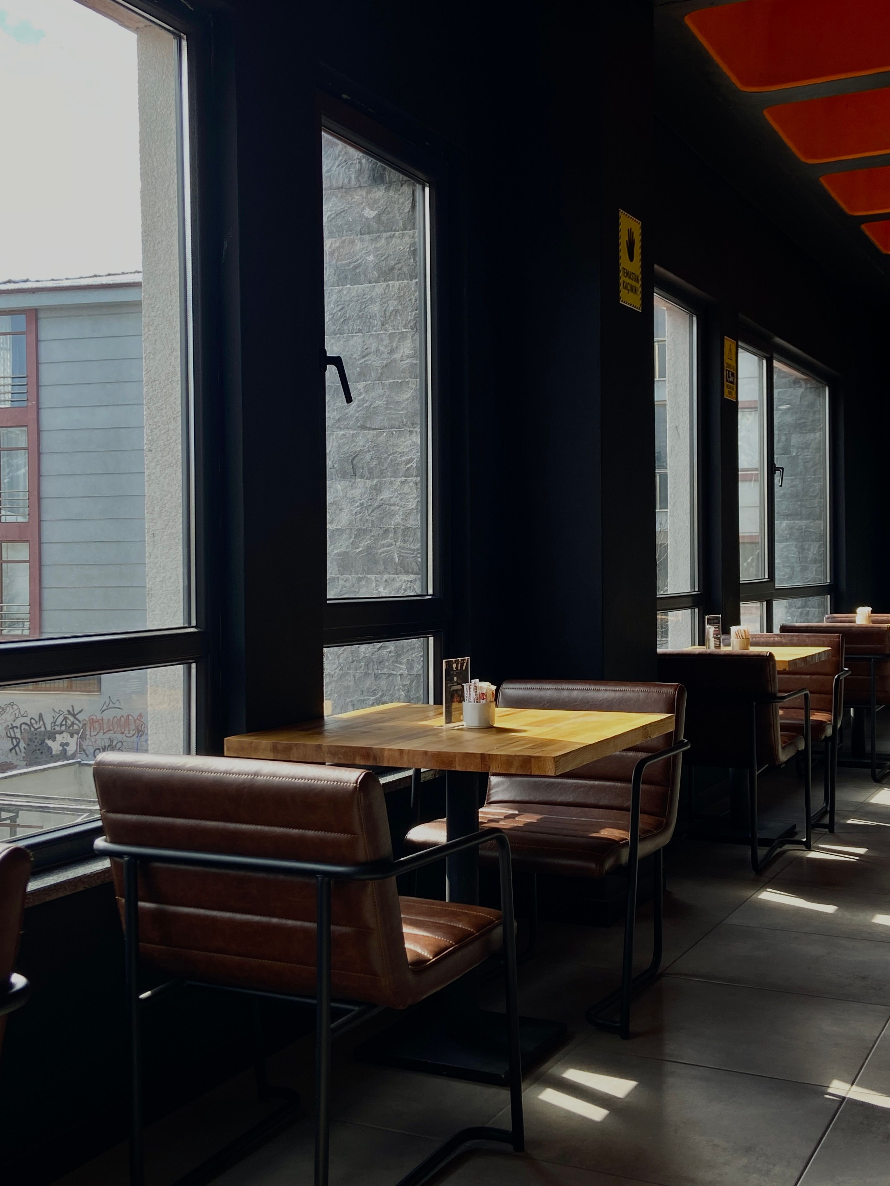 Cozy Cafe Interior with Ambient Lighting · Free Stock Photo