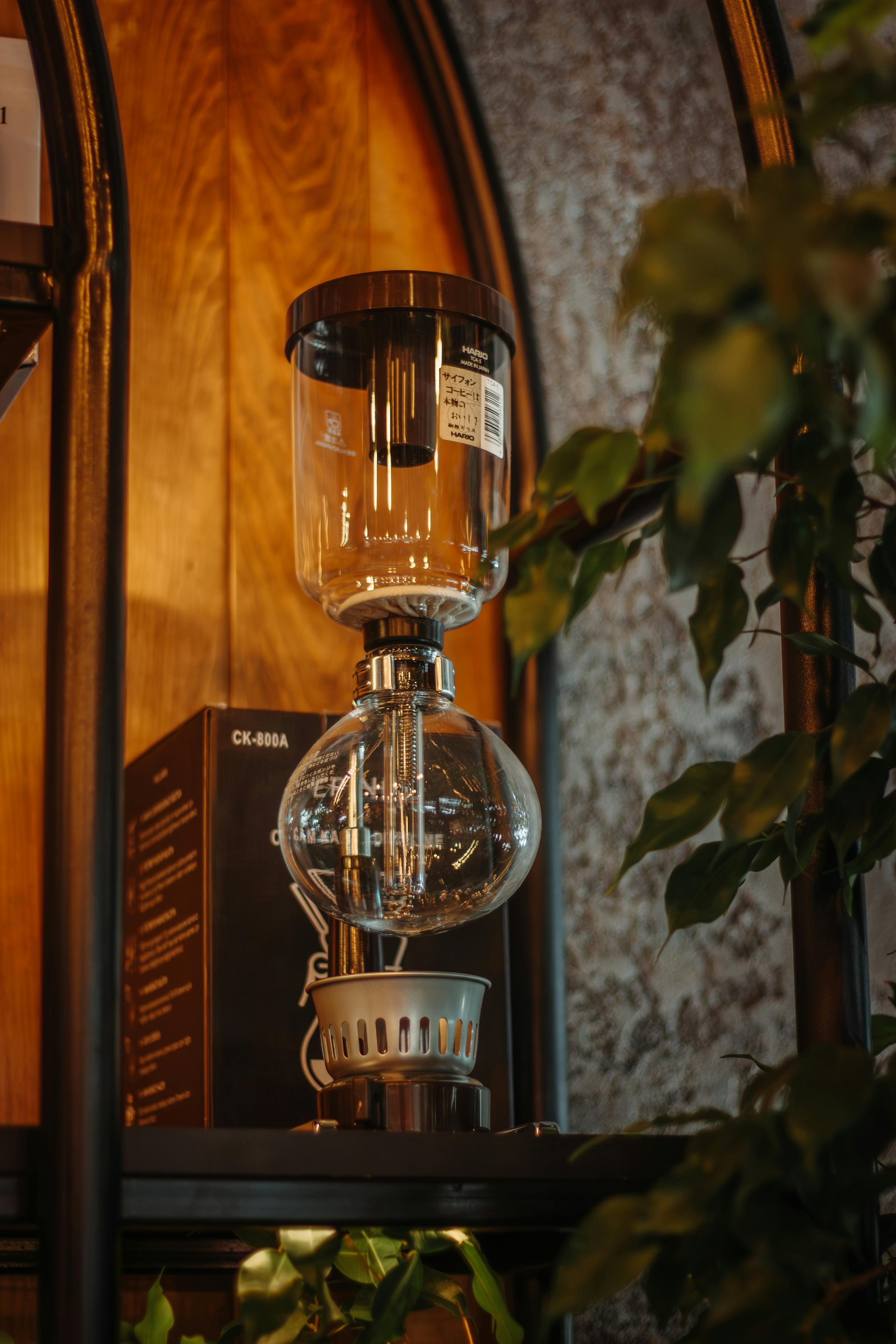 Vintage Glass Coffee Maker on Shelf · Free Stock Photo