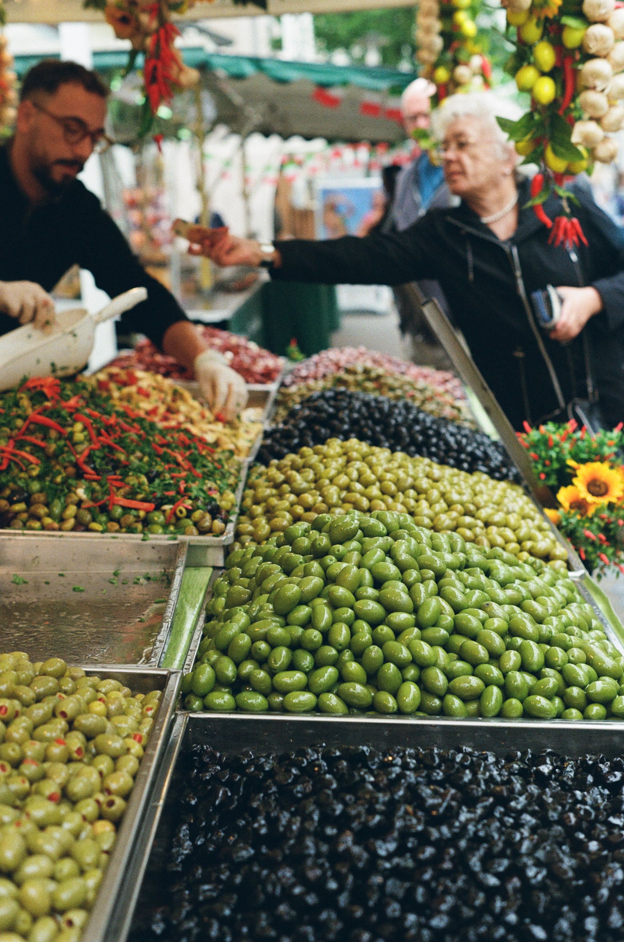 Vibrant Olive Market Stall in Unna, Germany · Free Stock Photo