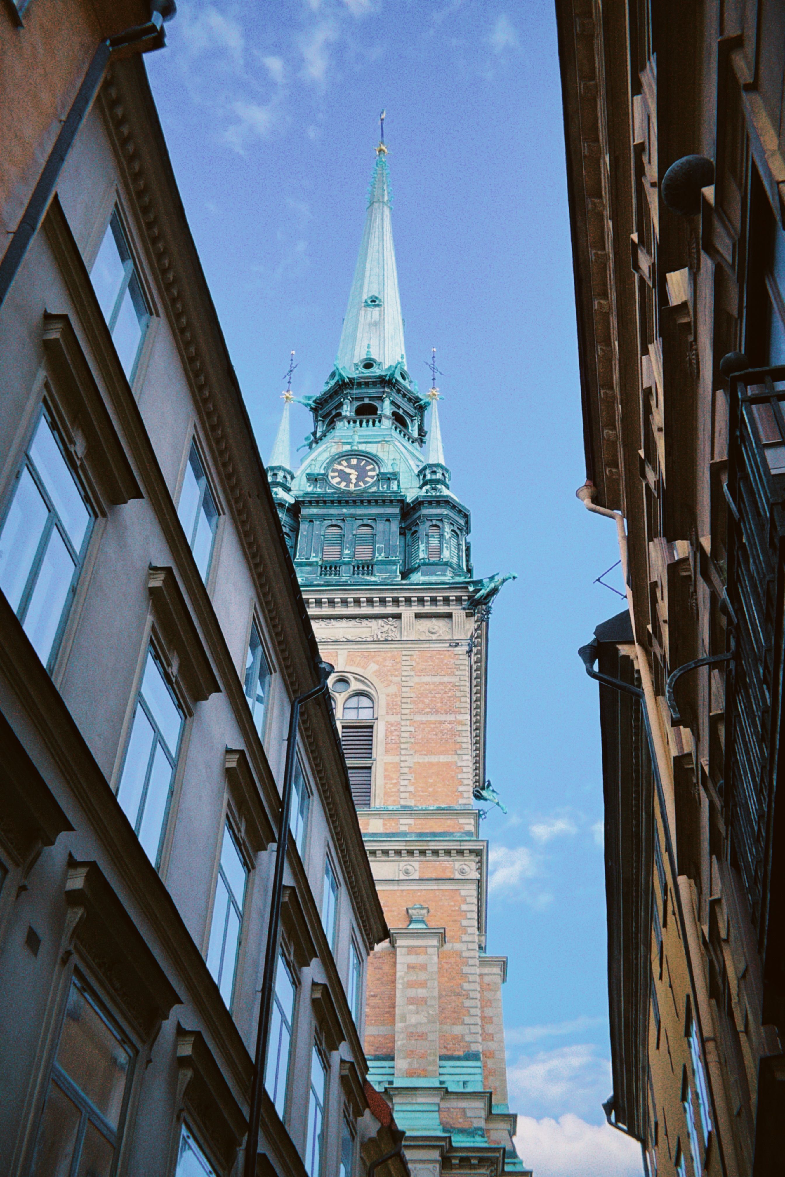Historic Stockholm Church Tower Under Blue Sky · Free Stock Photo