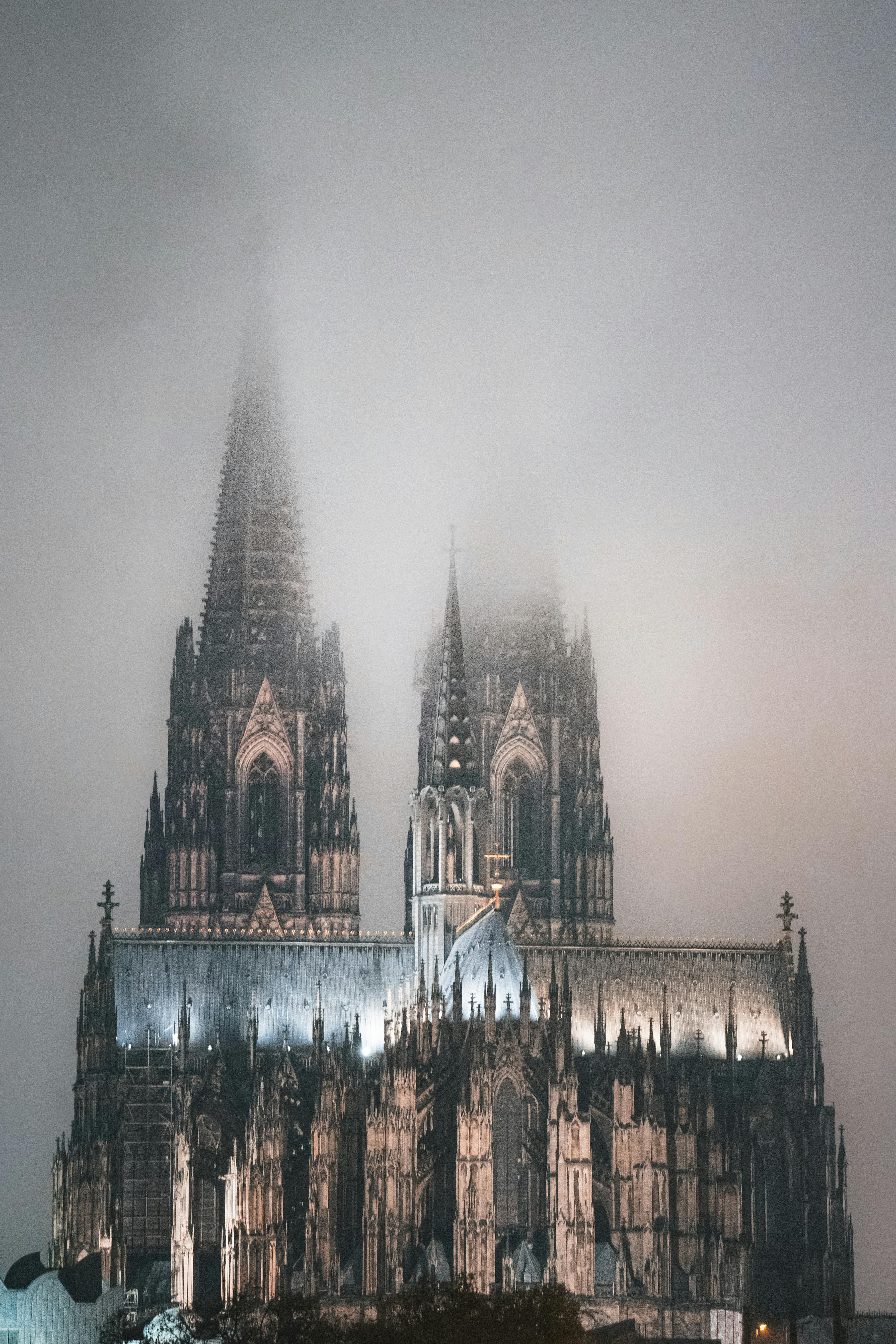 Cologne Cathedral Shrouded in Fog at Night · Free Stock Photo