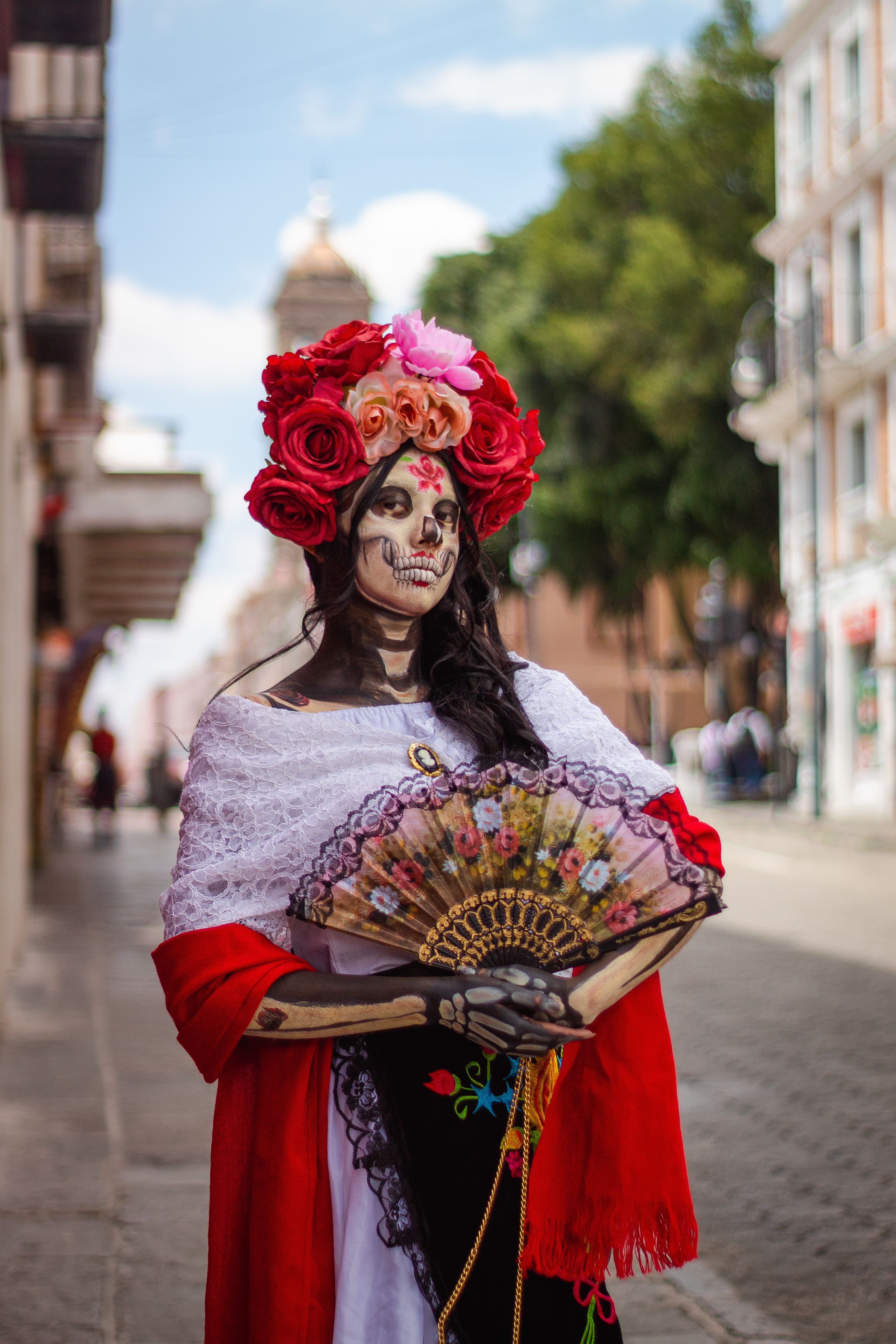 Elegant Catrina in Traditional Dress on Puebla Street · Free Stock Photo