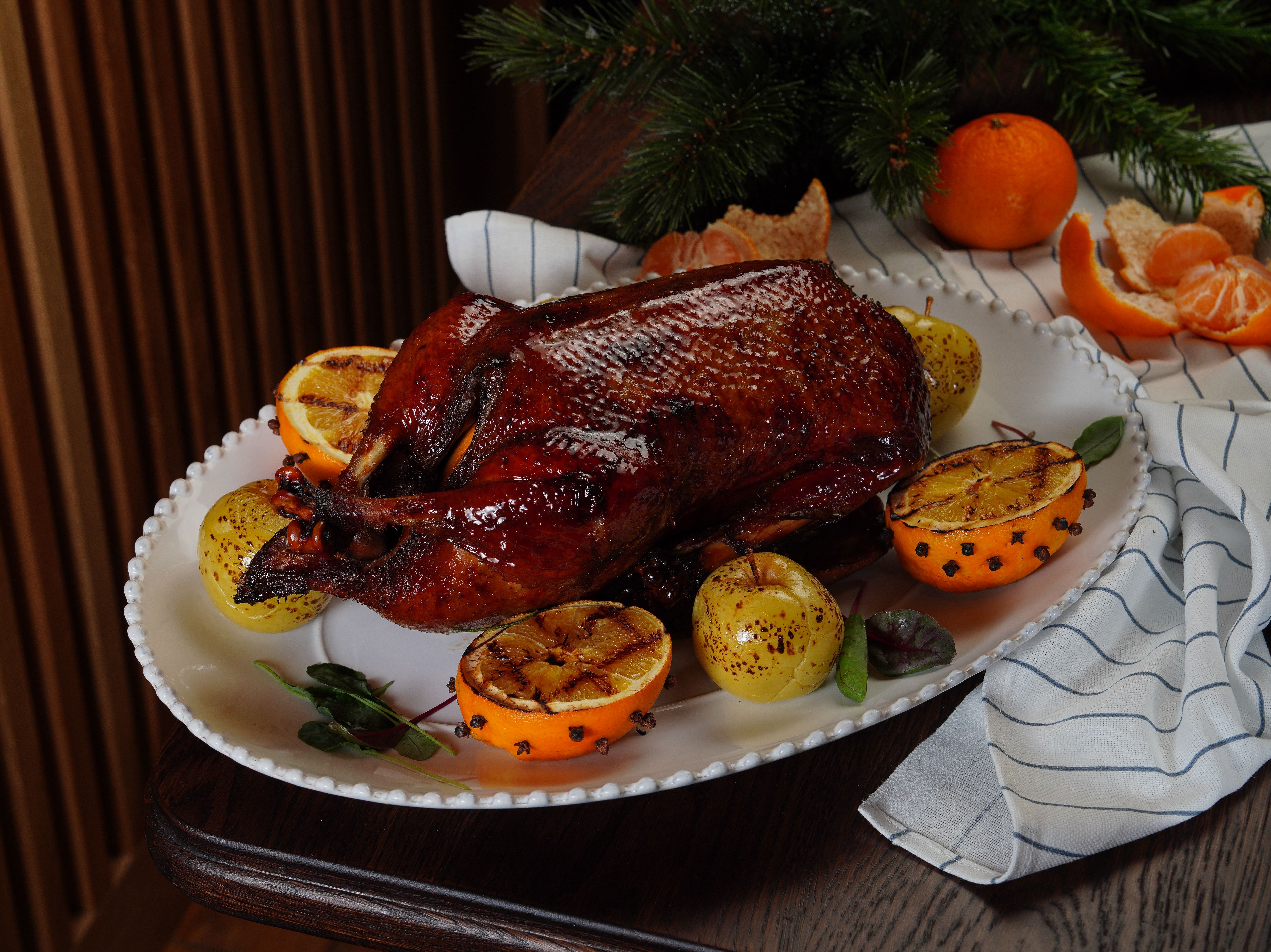 Festive roast duck with citrus and herbs · Free Stock Photo