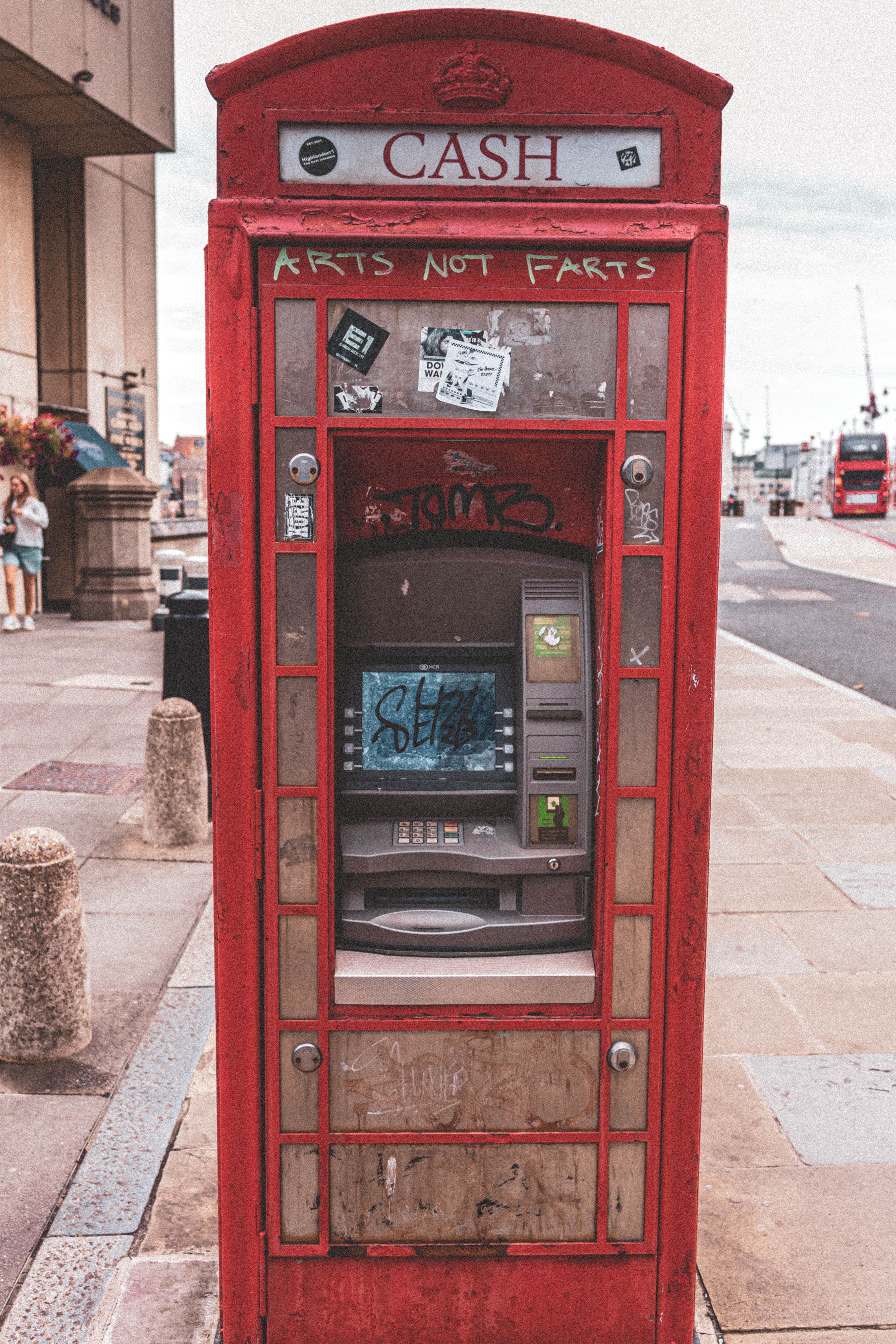 Iconic Red Telephone Booth ATM in London · Free Stock Photo