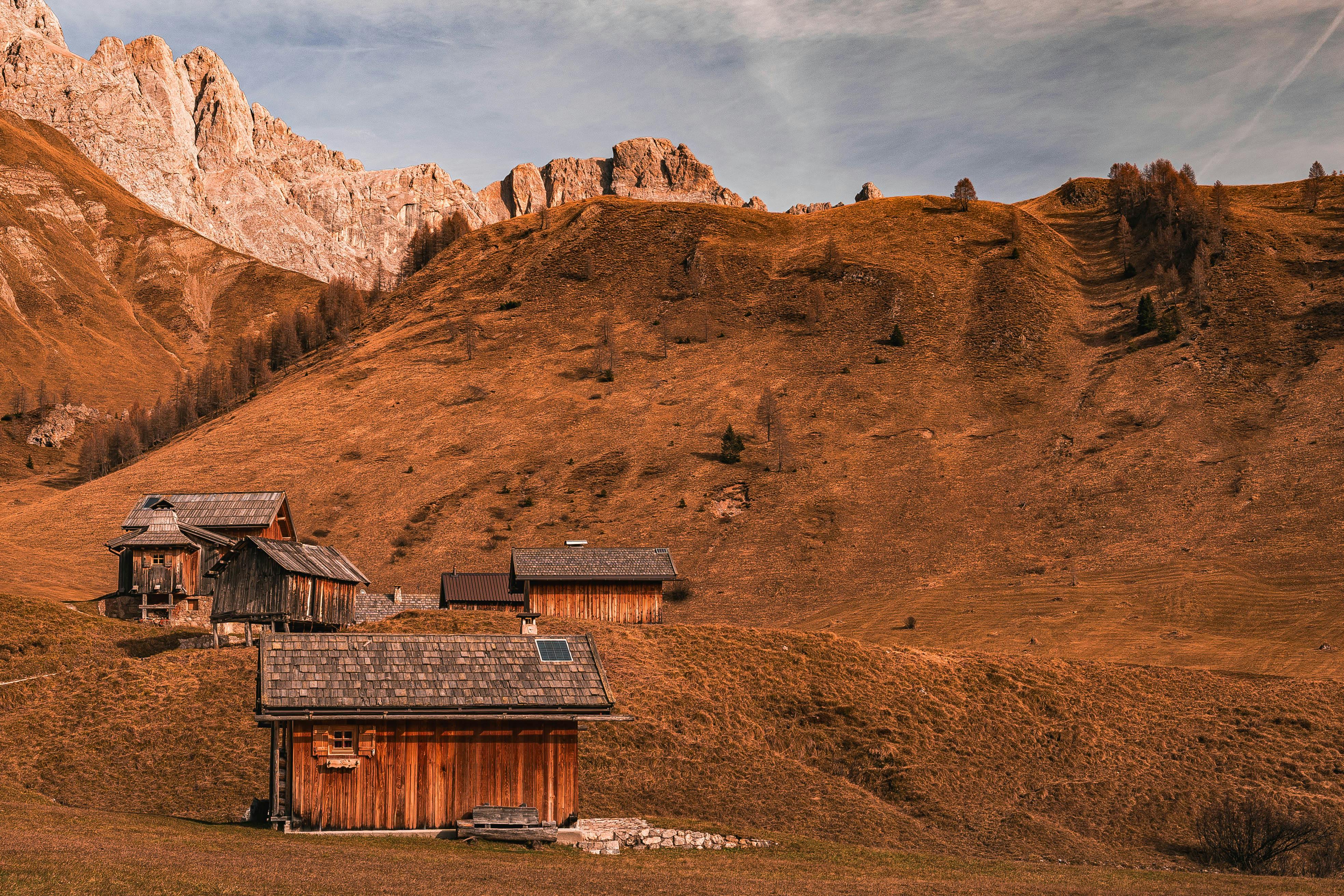 Rustic Mountain Cabins in Autumn Landscape · Free Stock Photo