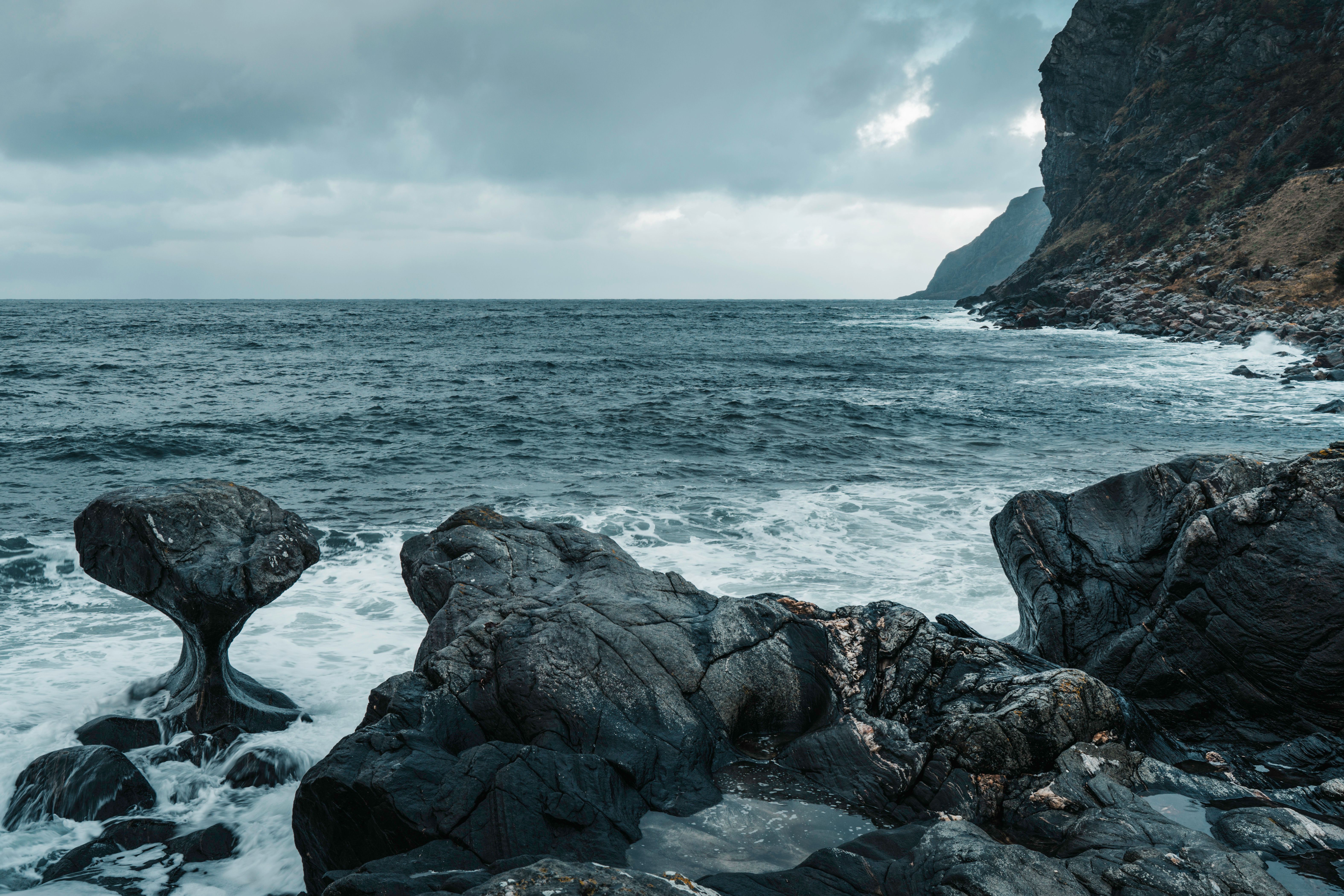 Dramatic Coastal Cliffs and Sea in Norway · Free Stock Photo