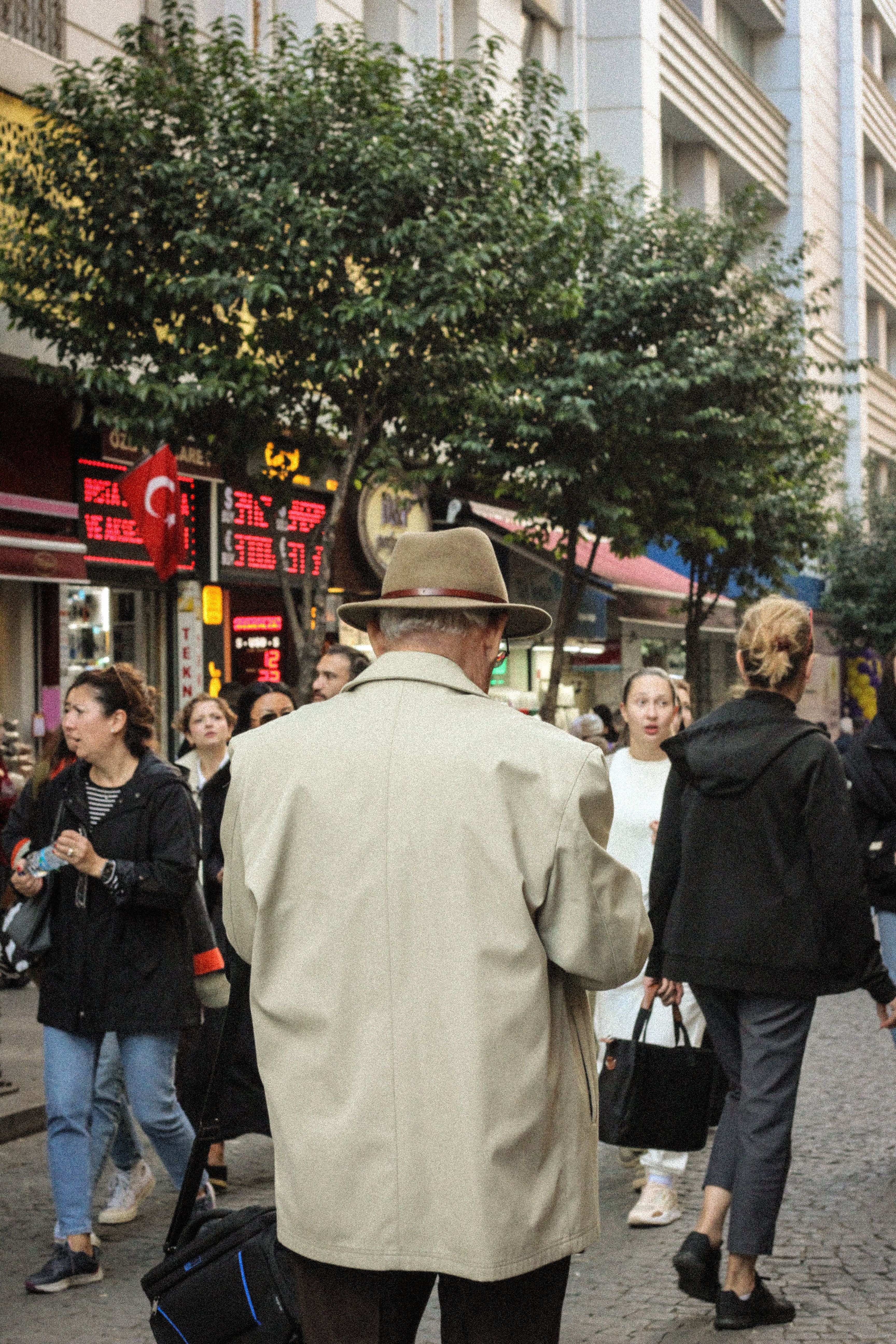 Busy Urban Street Scene with Pedestrians · Free Stock Photo