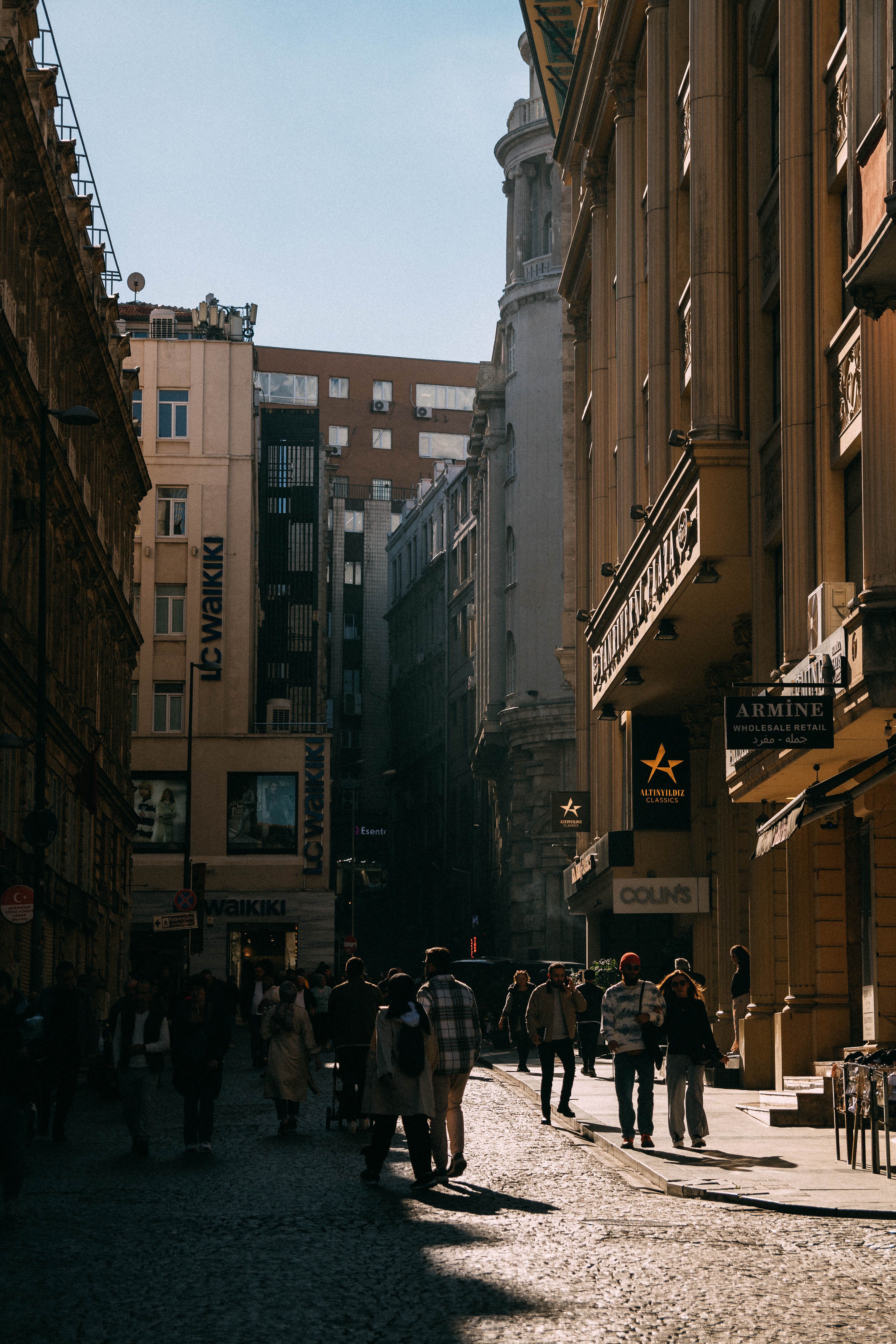Bustling European Street with Shoppers · Free Stock Photo