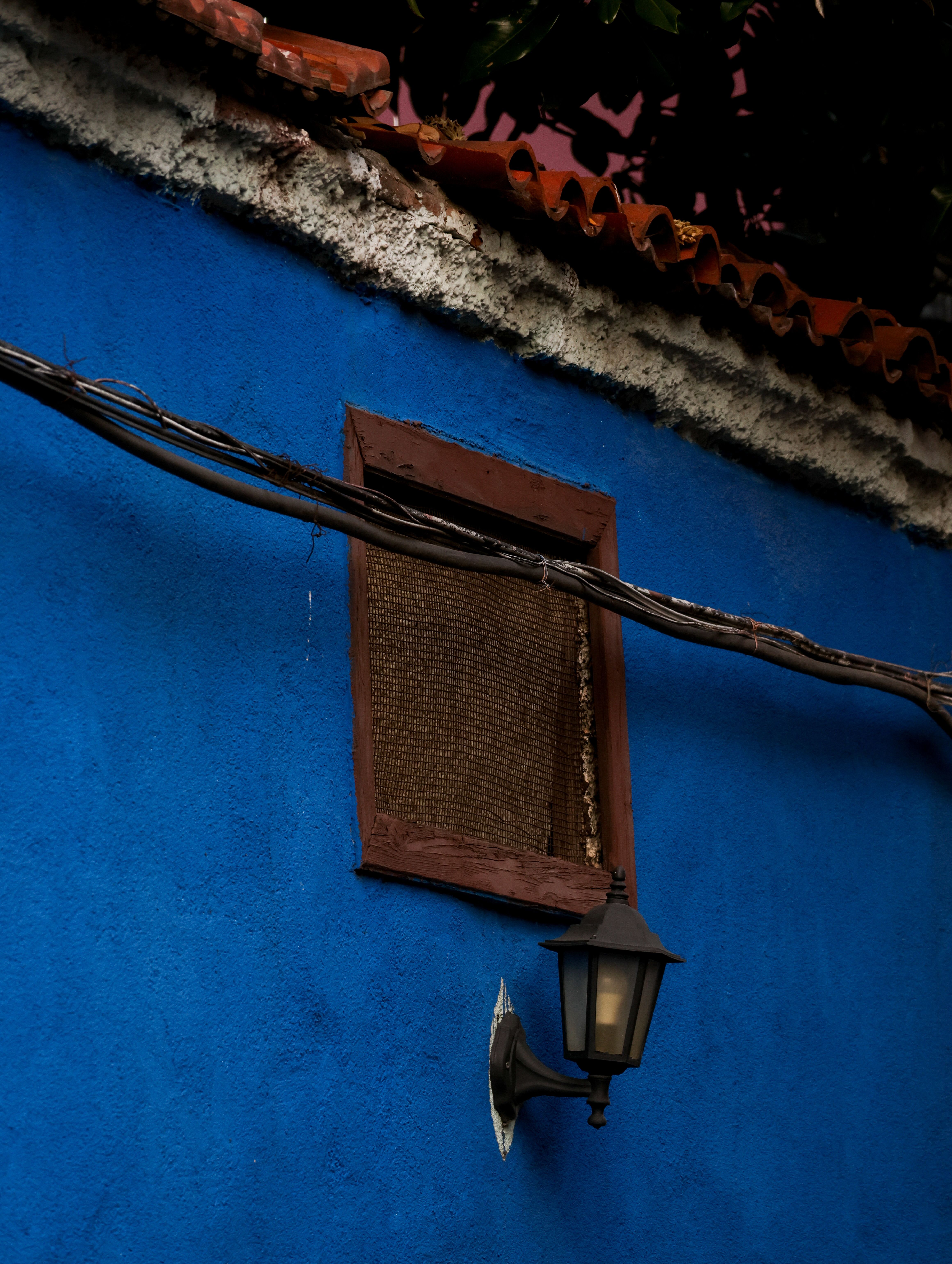 Vintage Street Lamp on Blue Rustic Wall in Bursa · Free Stock Photo