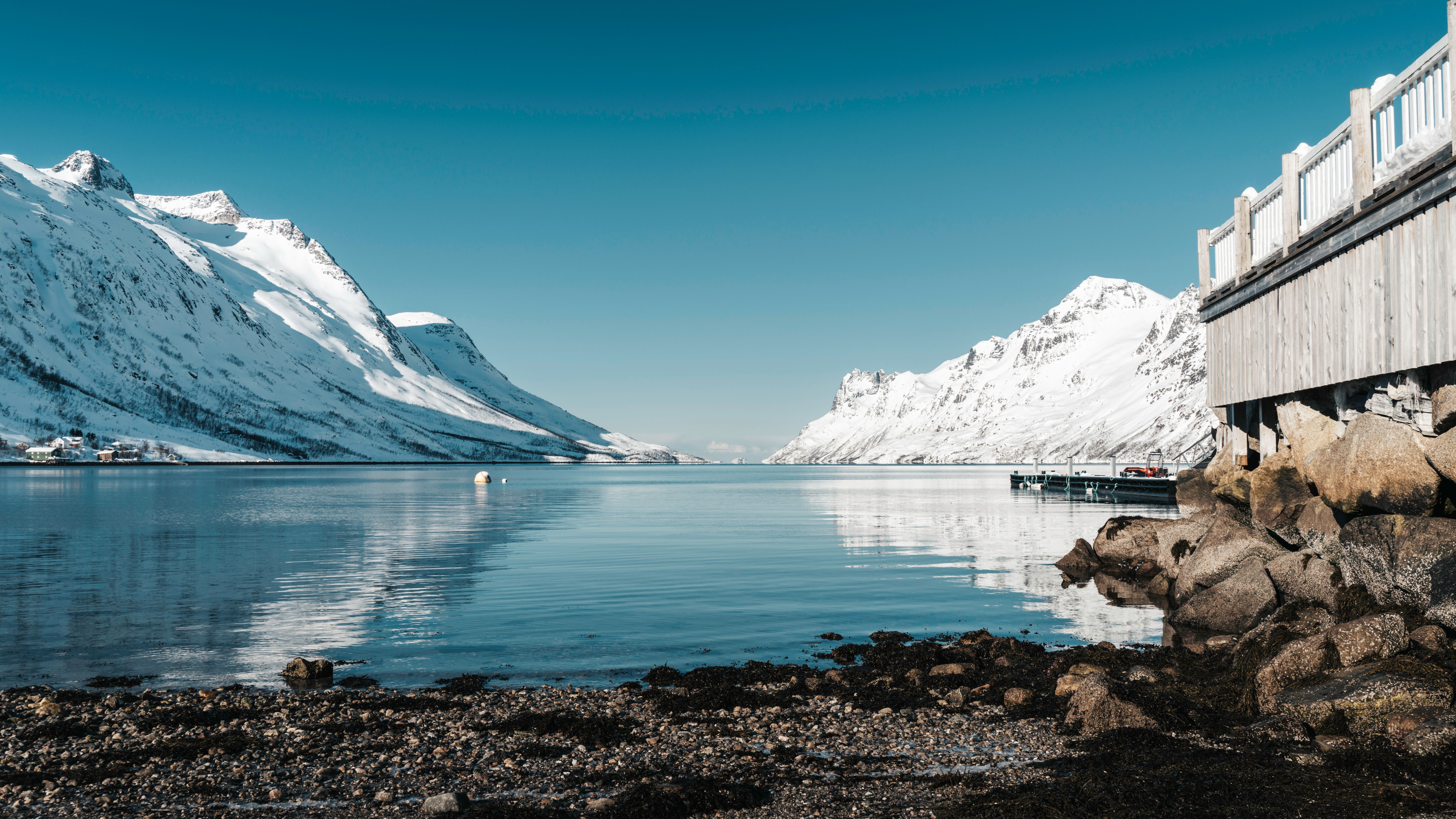 Stunning Snow-Capped Norwegian Fjord Landscape · Free Stock Photo