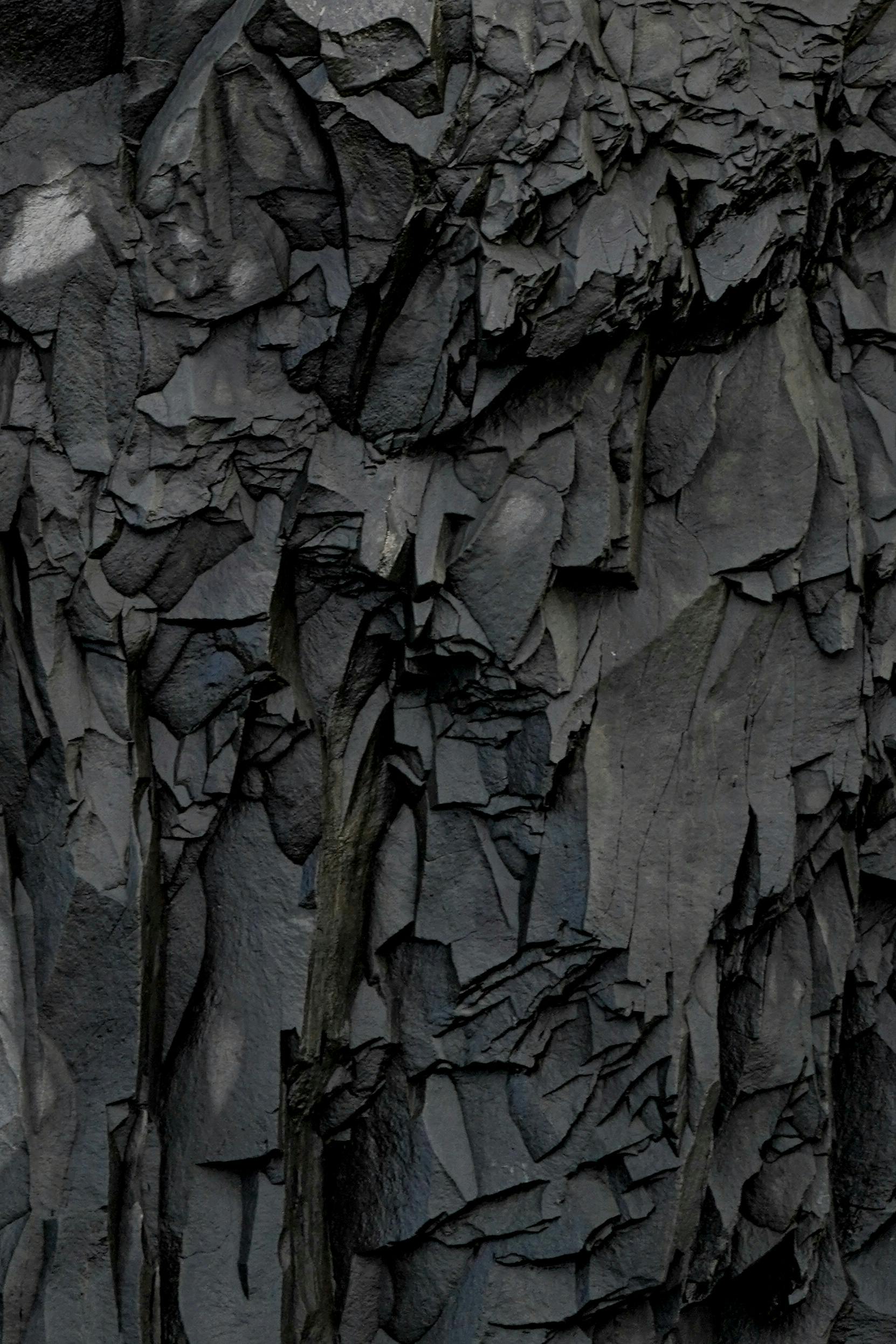 Intricate Dark Rock Formation Texture · Free Stock Photo