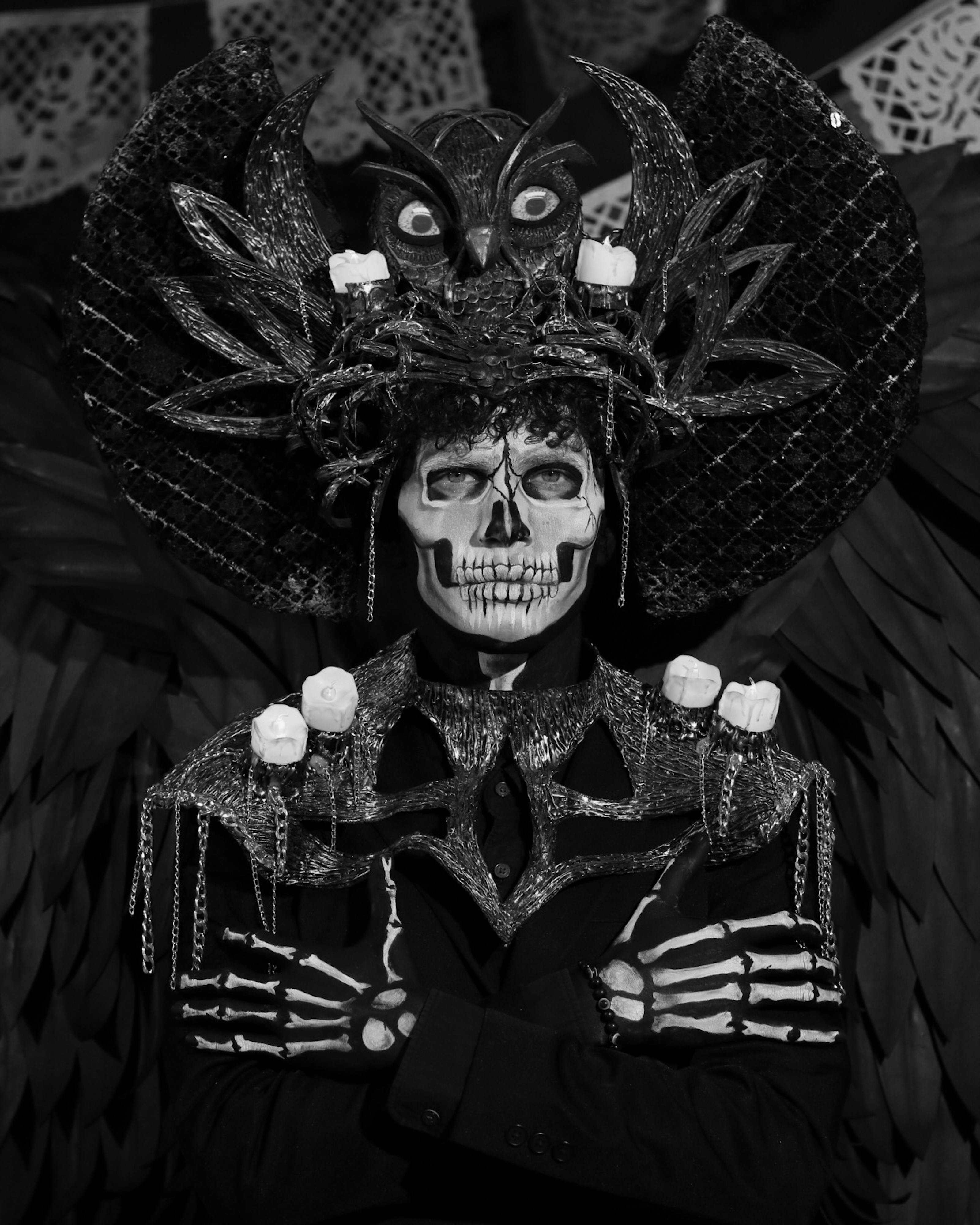 Dark Artistic Portrait with Skull Makeup and Feathers · Free Stock Photo