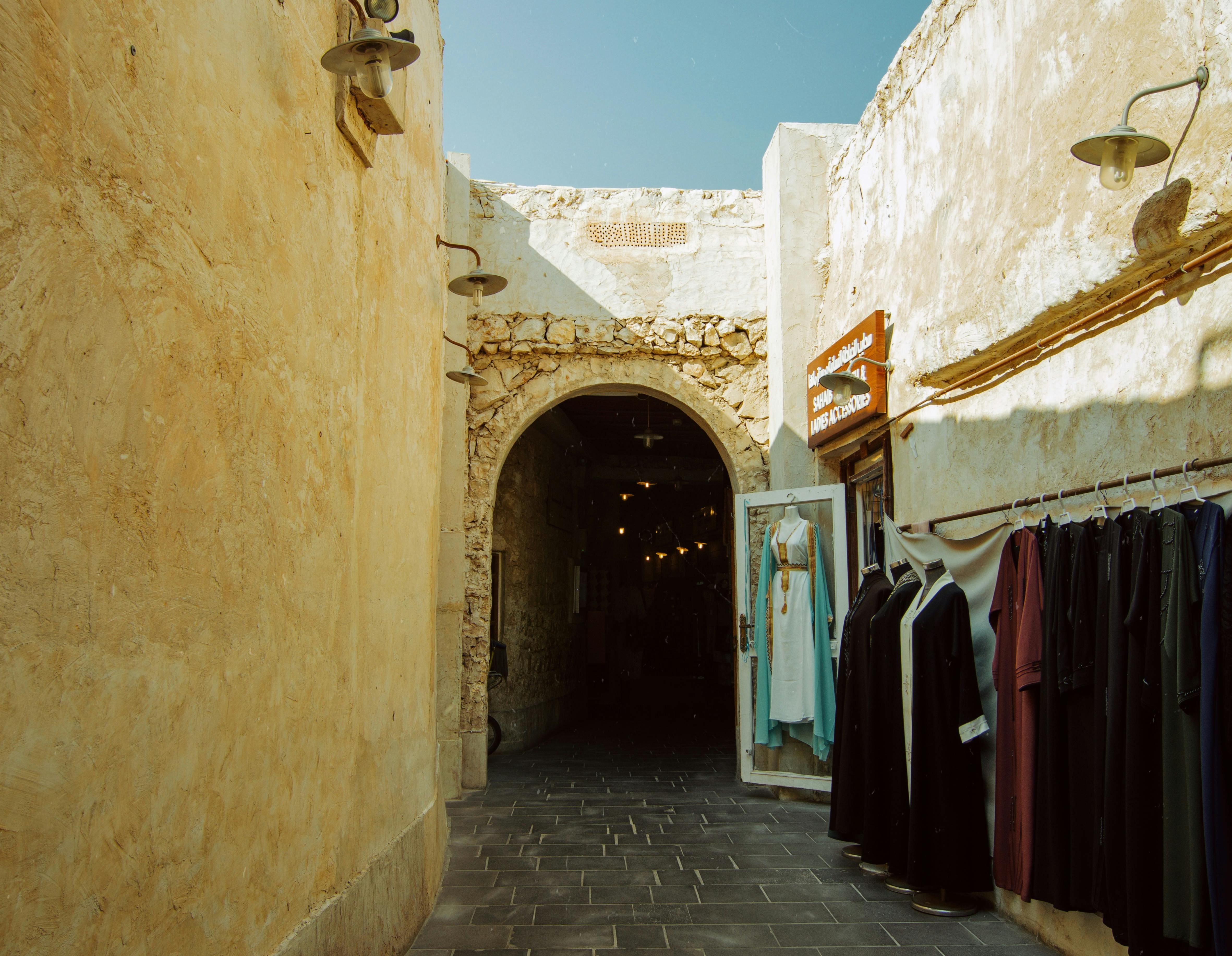 Traditional Middle Eastern Market Clothing Display · Free Stock Photo