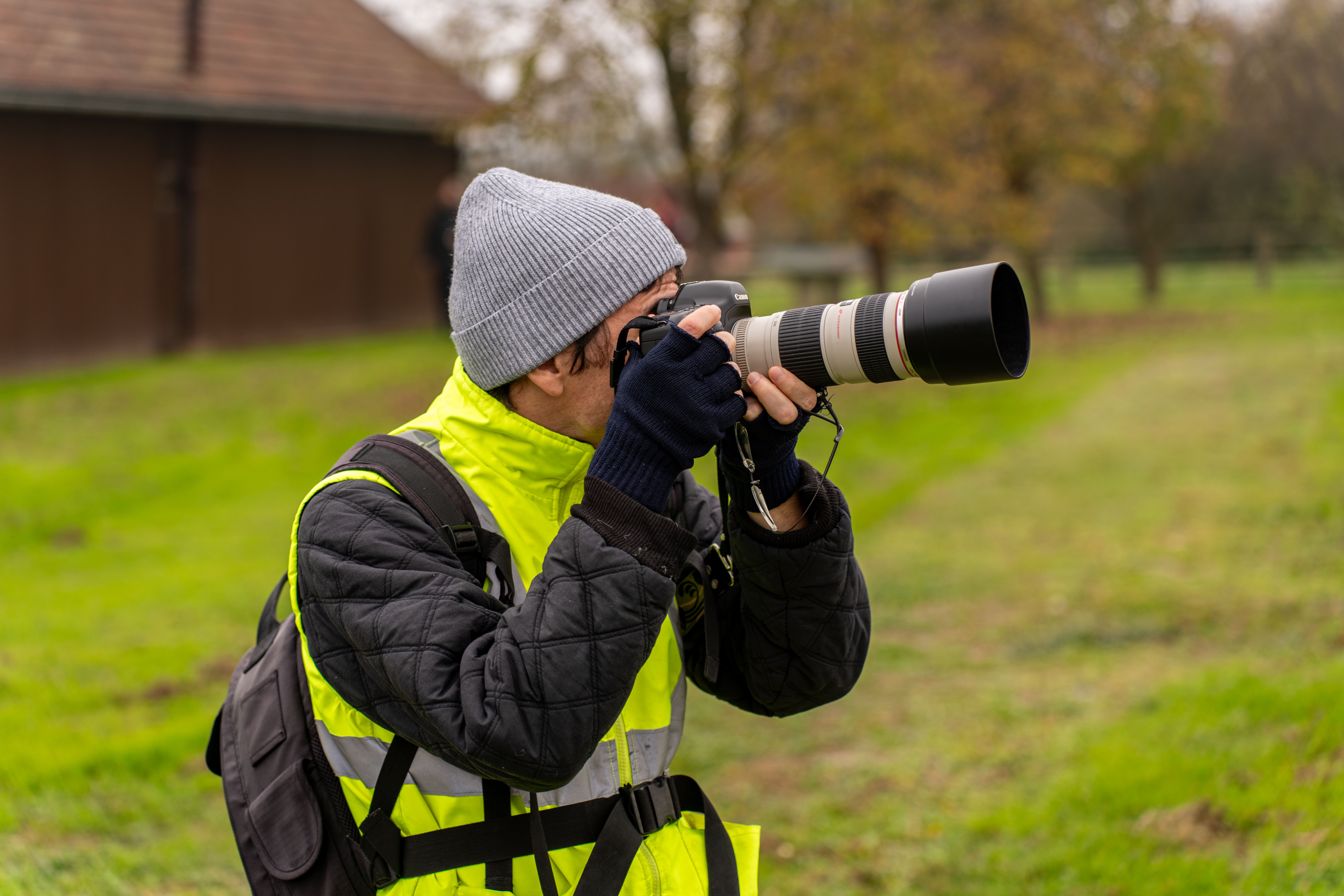Outdoor Photographer Shooting Nature with Telephoto Lens · Free Stock Photo