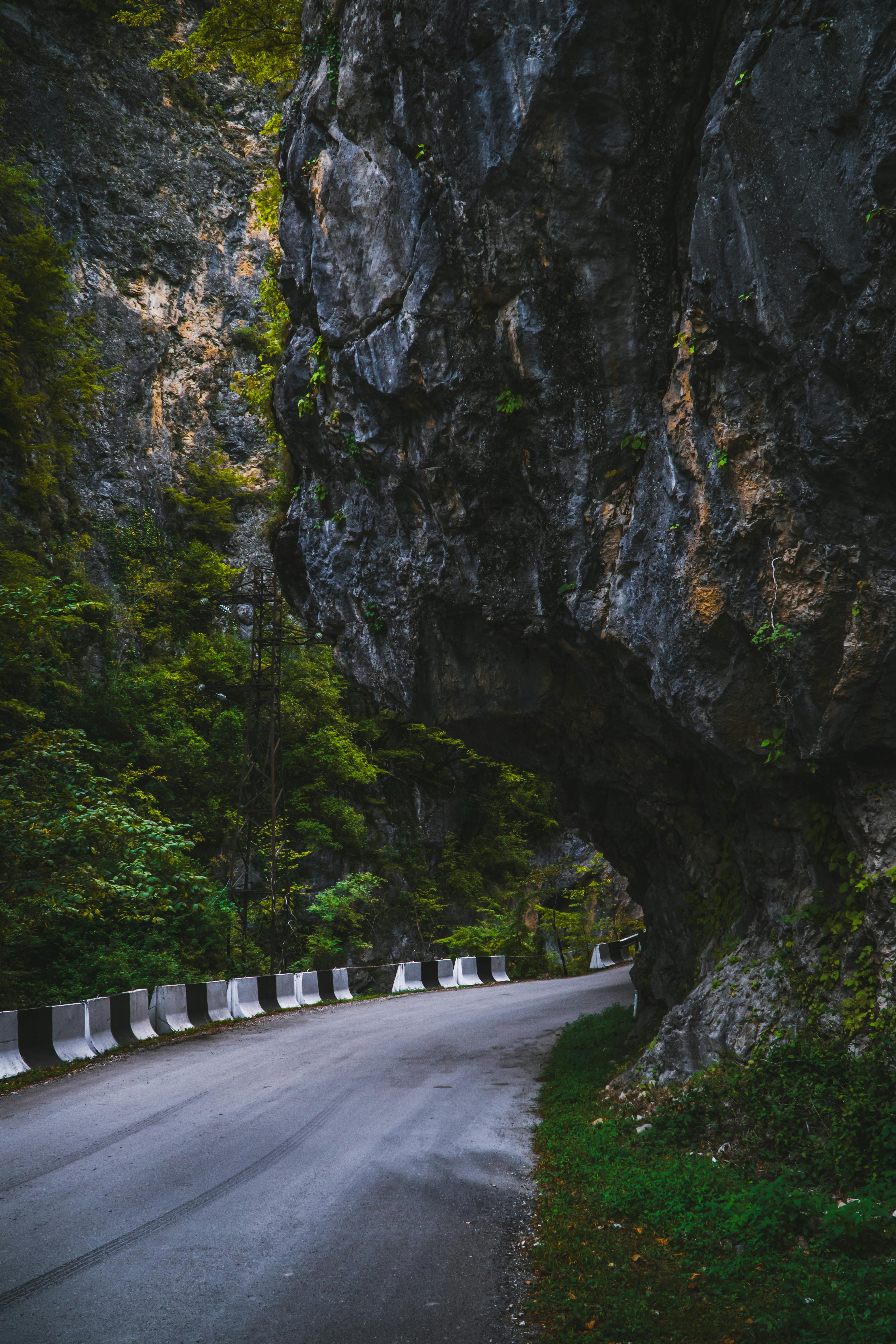 Scenic Mountain Road with Rock Formation in Nature · Free Stock Photo