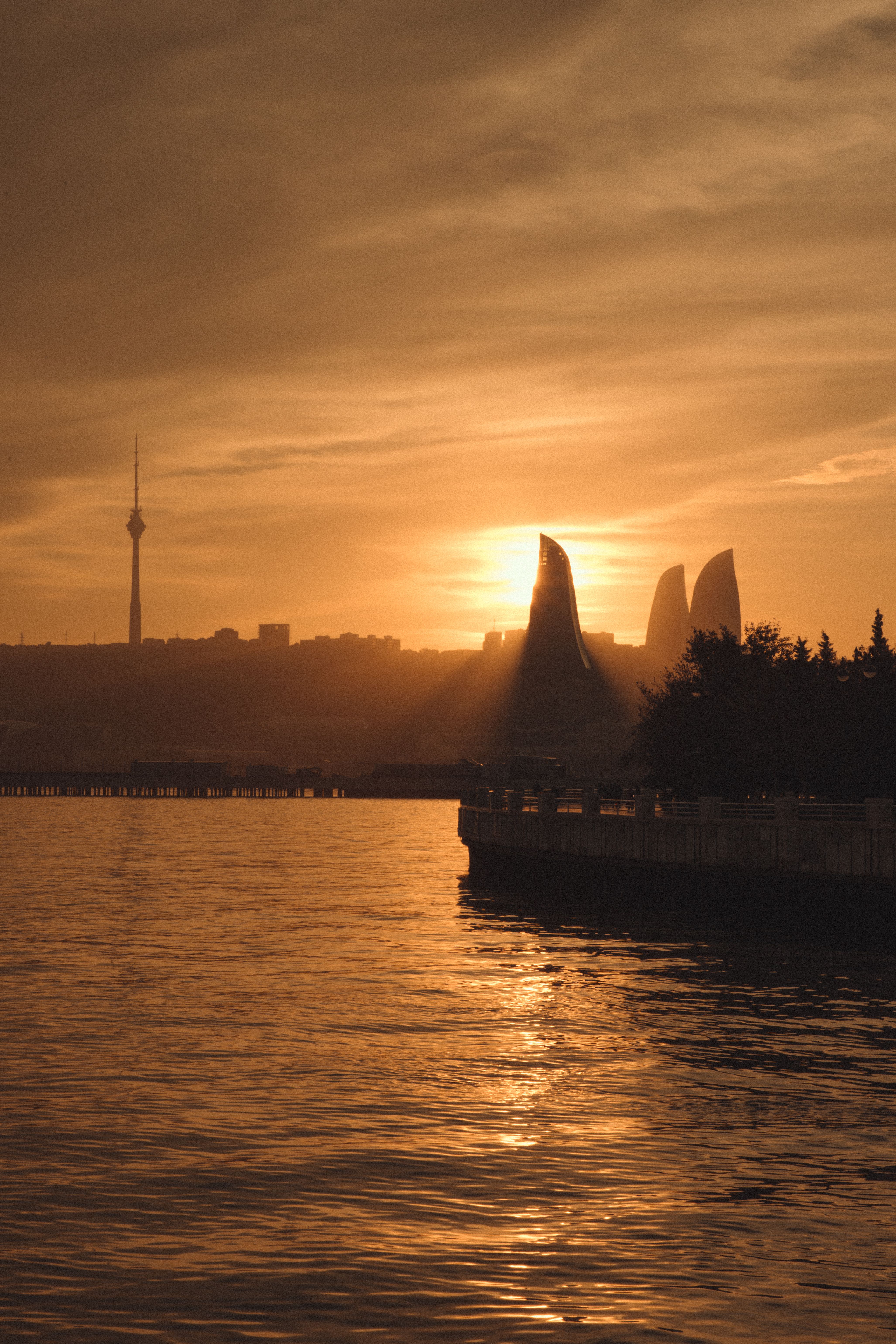 Sunset Over Baku Skyline with Flame Towers · Free Stock Photo