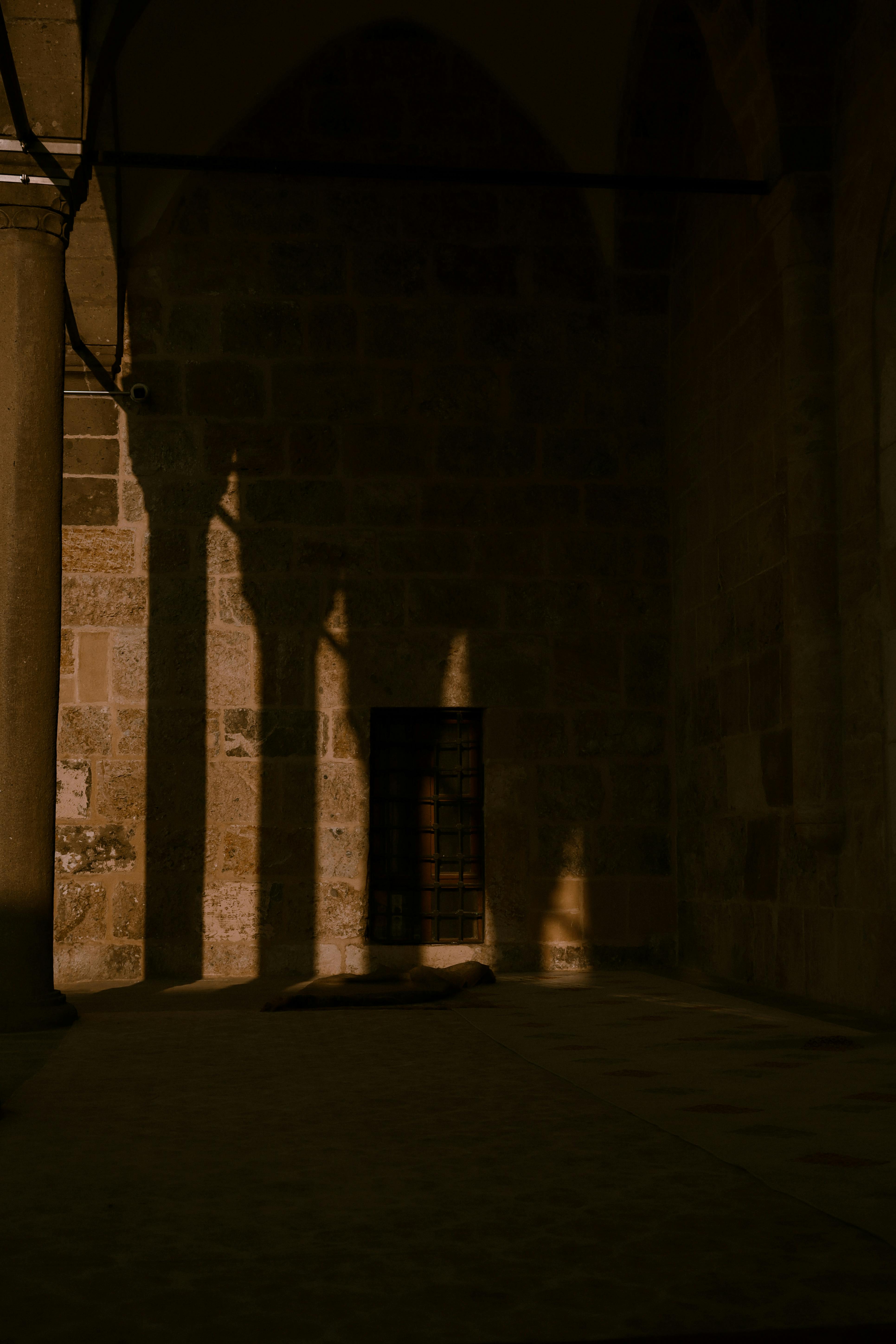 Moody Architectural Shadows in Ancient Structure · Free Stock Photo