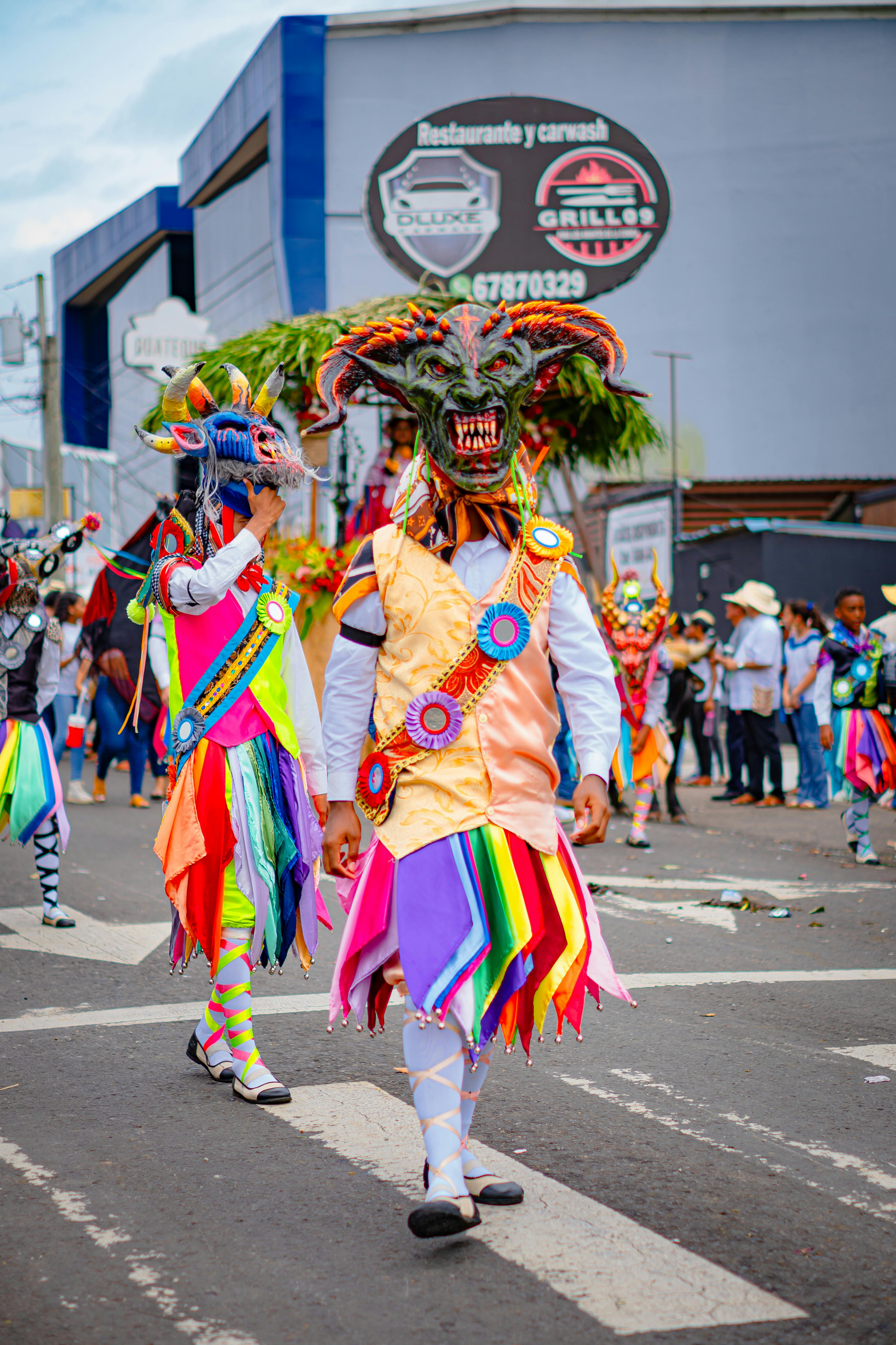 Colorful Traditional Festival Parade in Street · Free Stock Photo