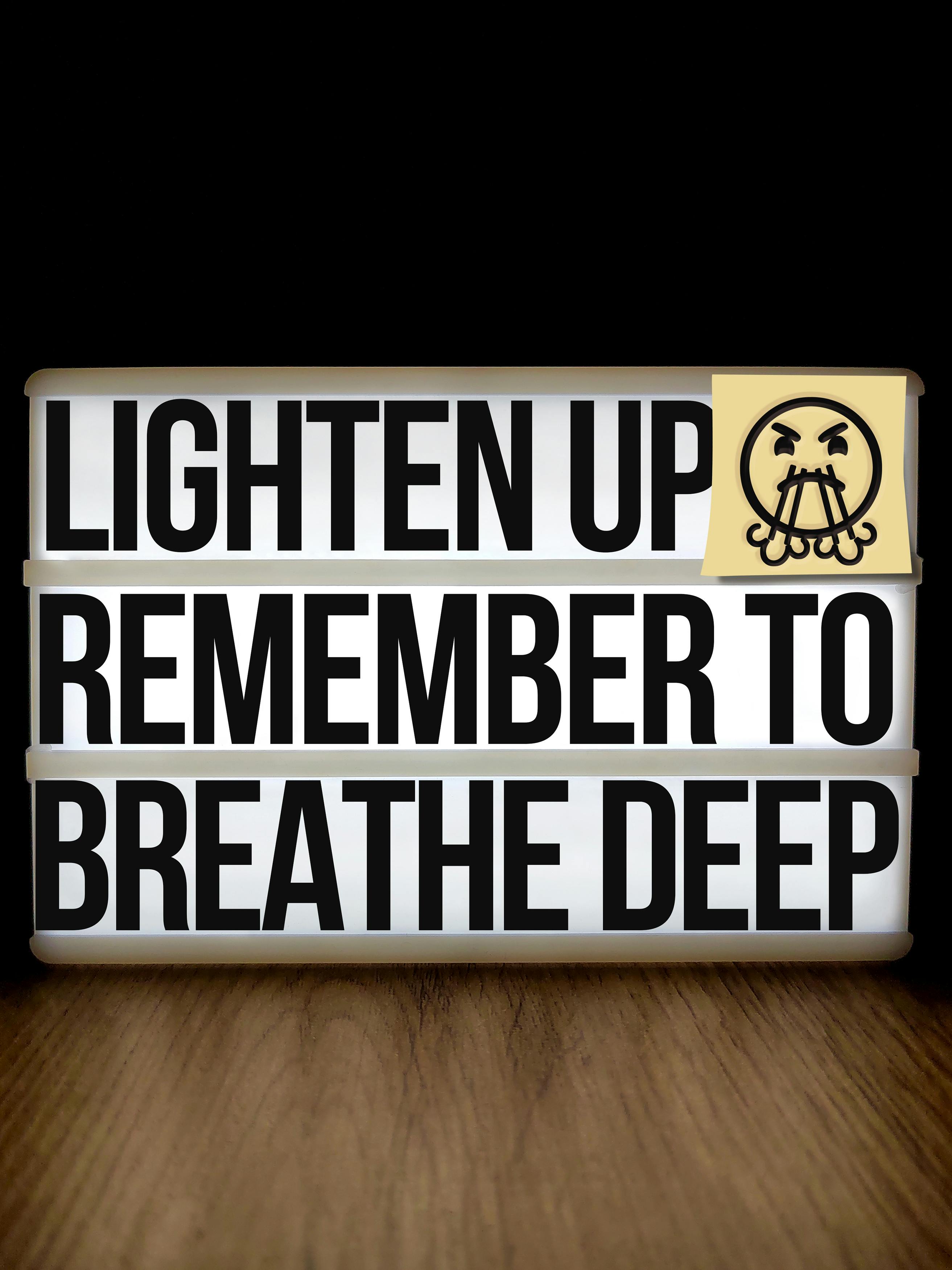 Inspirational Quote on Lightbox with Drawing · Free Stock Photo