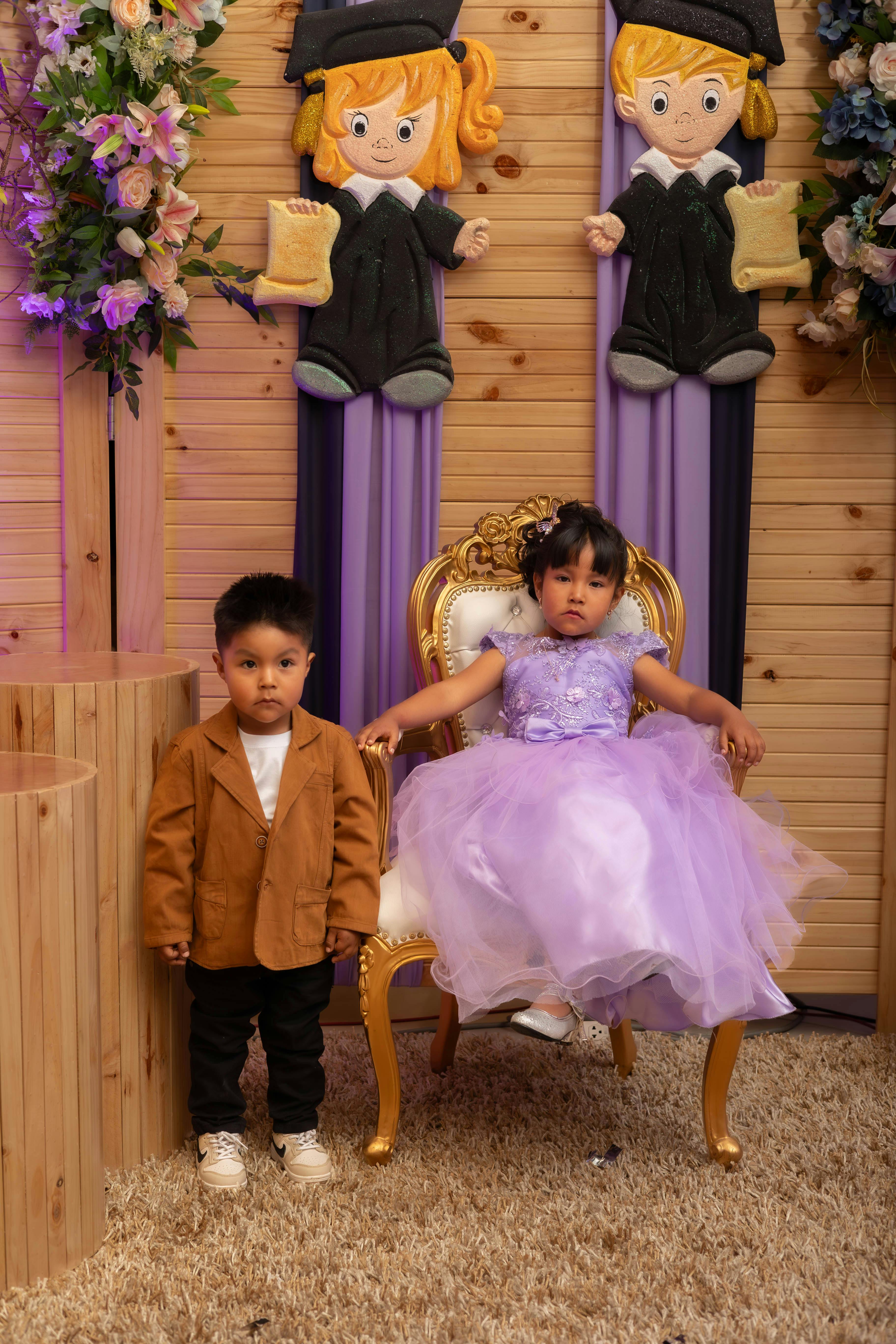 Elegant Children's Graduation Celebration Scene · Free Stock Photo