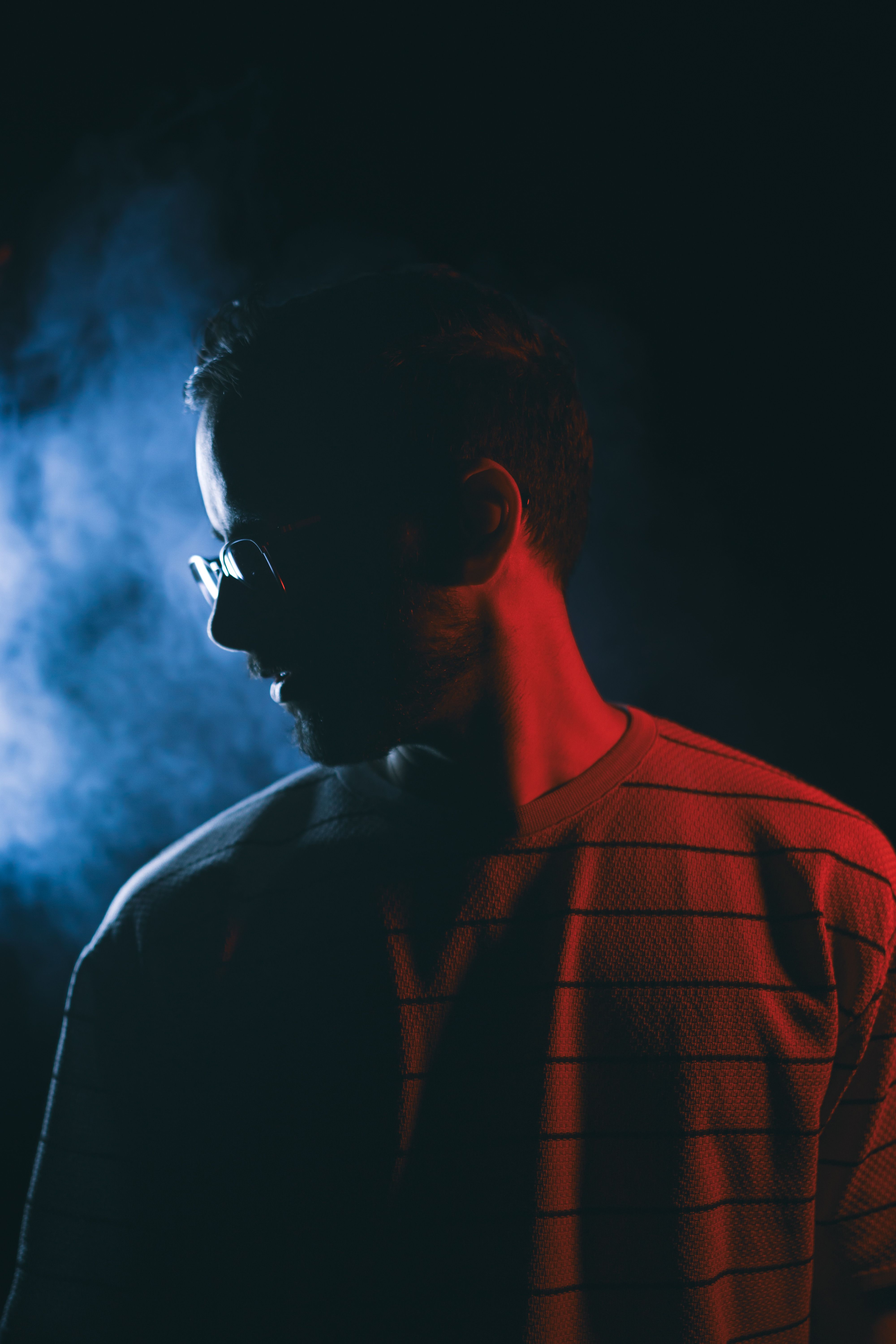 Moody Portrait of a Man in Colored Lighting · Free Stock Photo