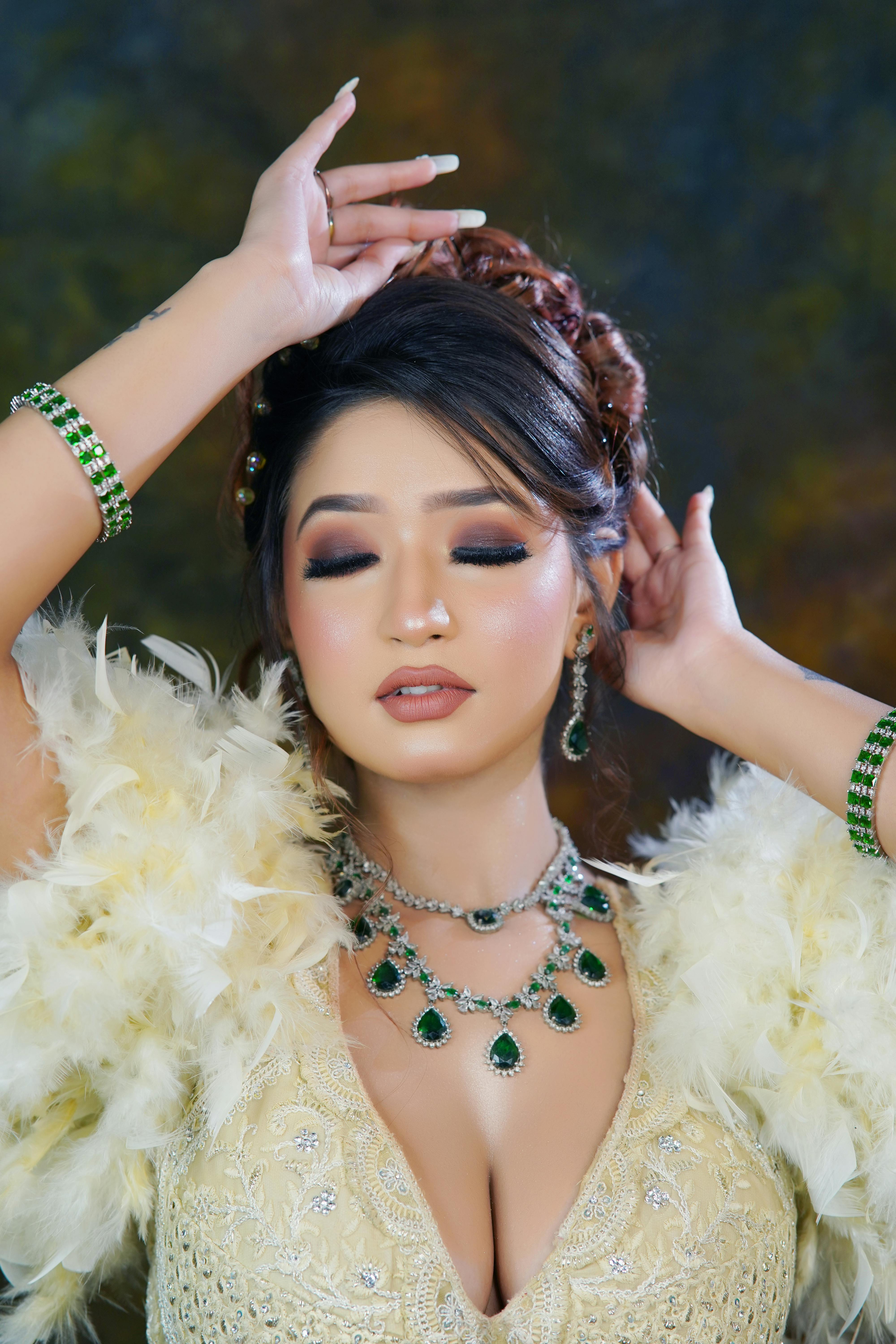 Elegant Portrait of Woman in Glamorous Jewelry · Free Stock Photo