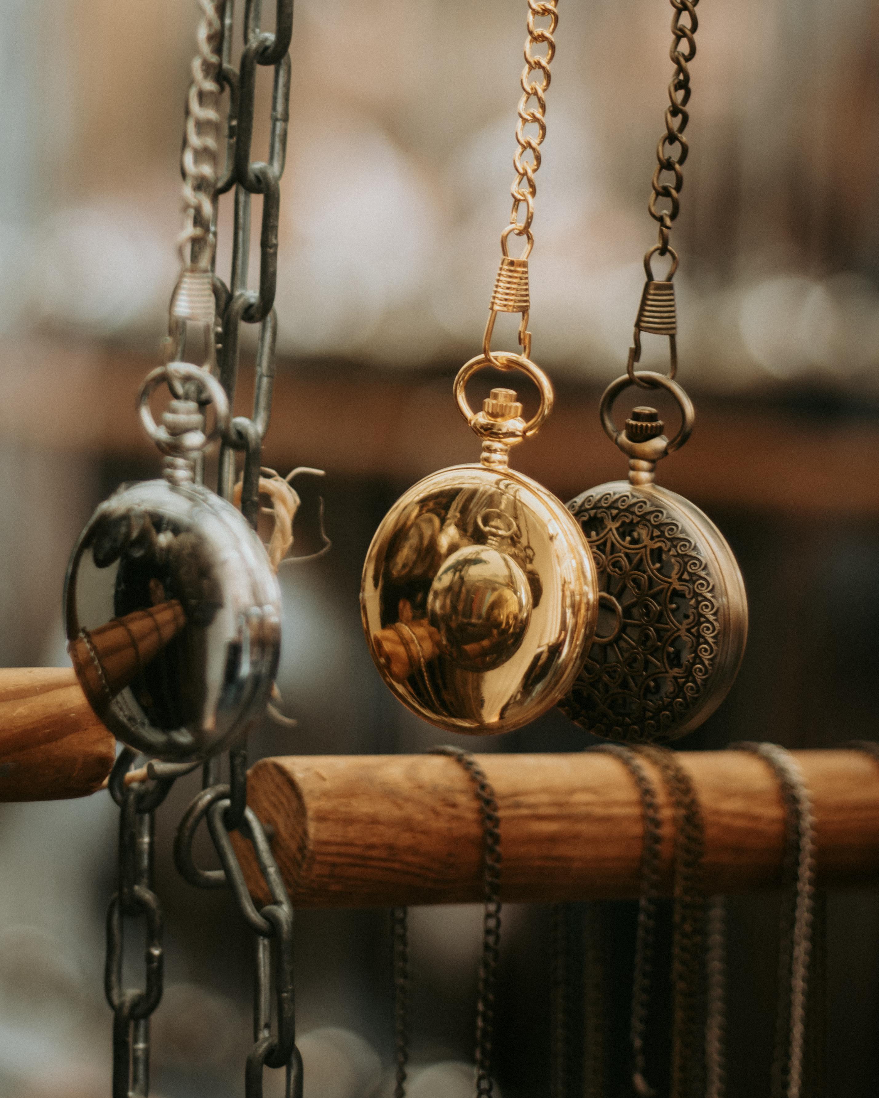 Vintage Pocket Watches Hanging in Madrid Market · Free Stock Photo