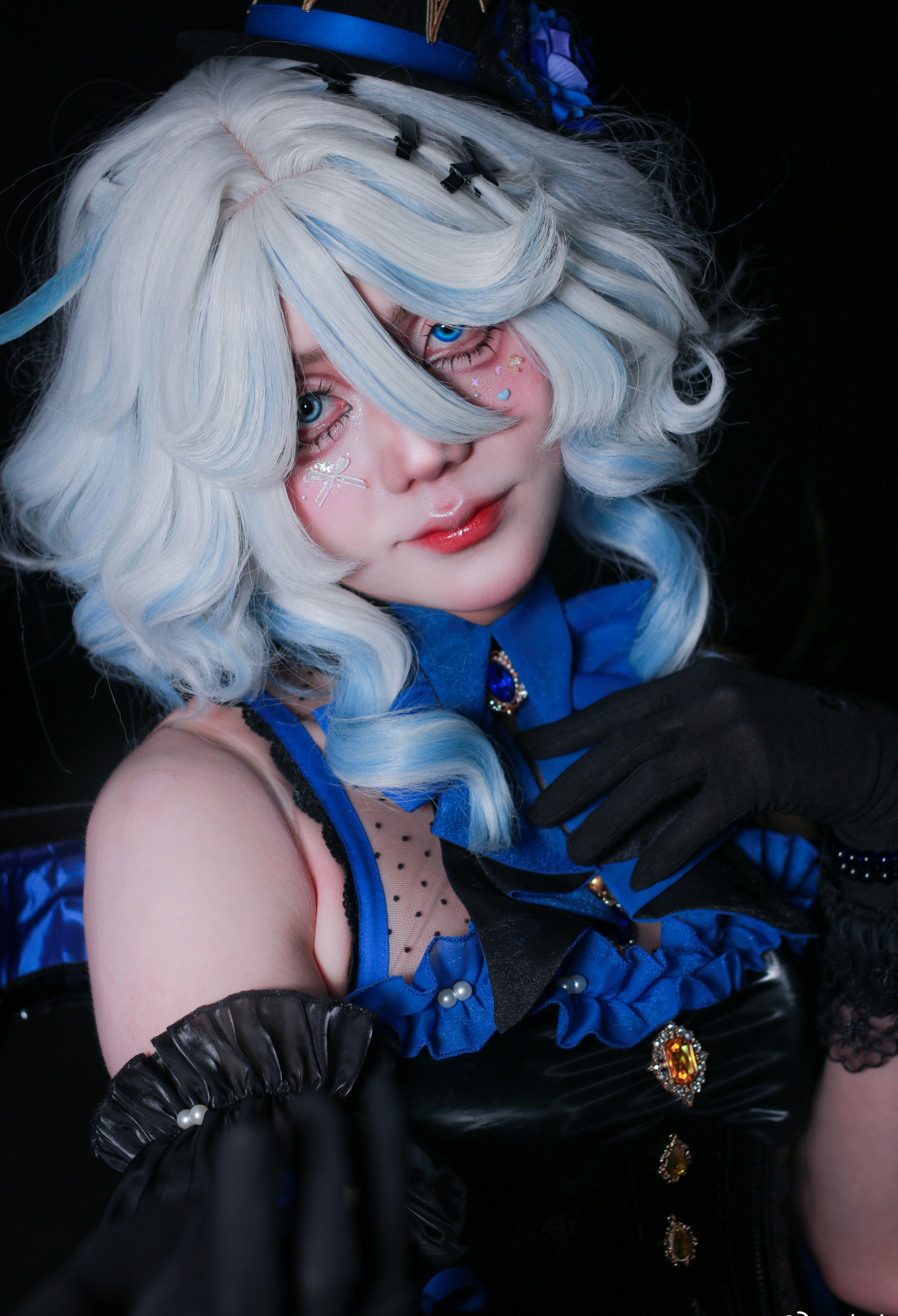 Cosplay in Blue: Enigmatic Character Portrait · Free Stock Photo