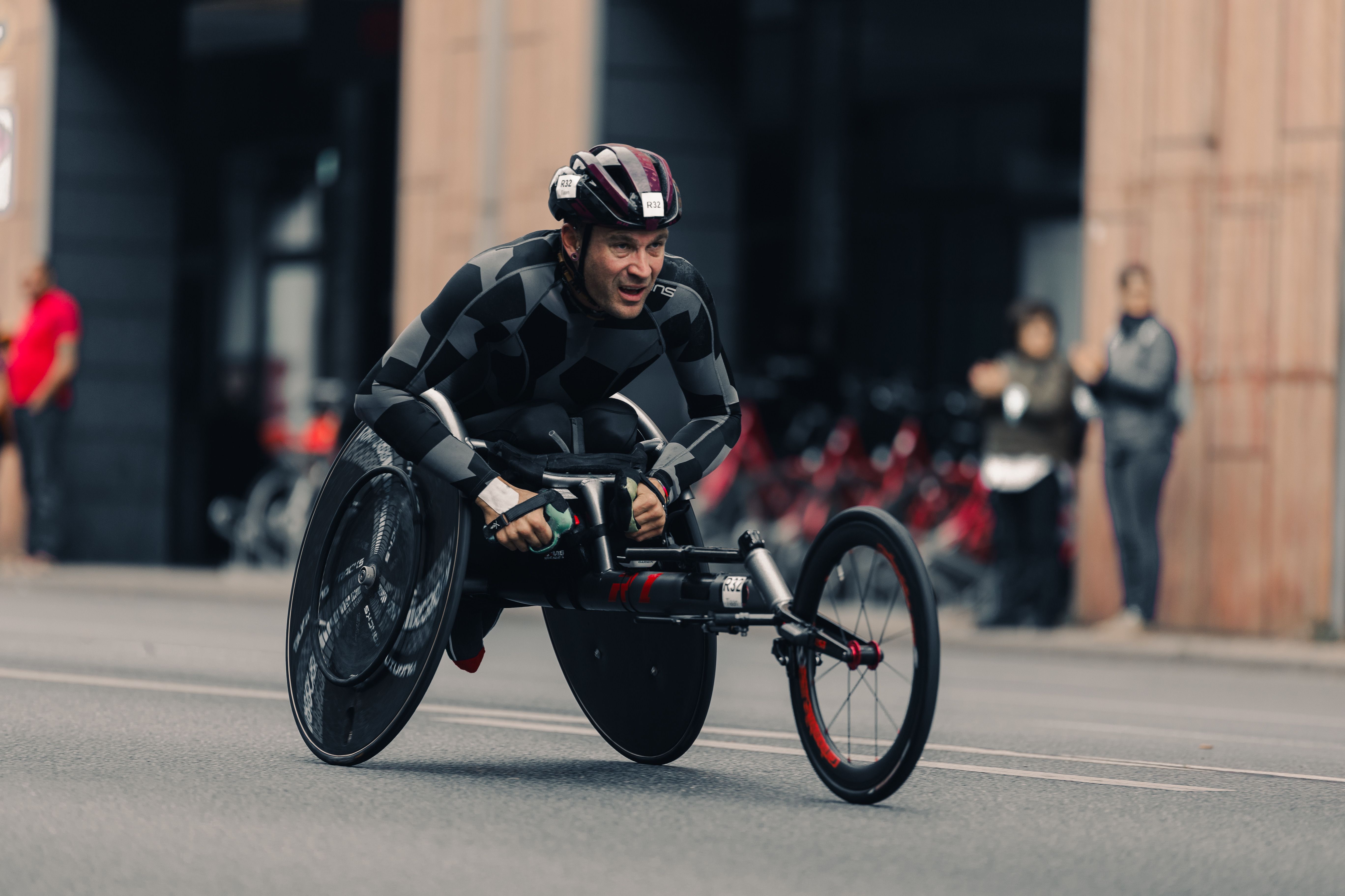 Wheelchair Athlete Racing in Berlin Marathon · Free Stock Photo