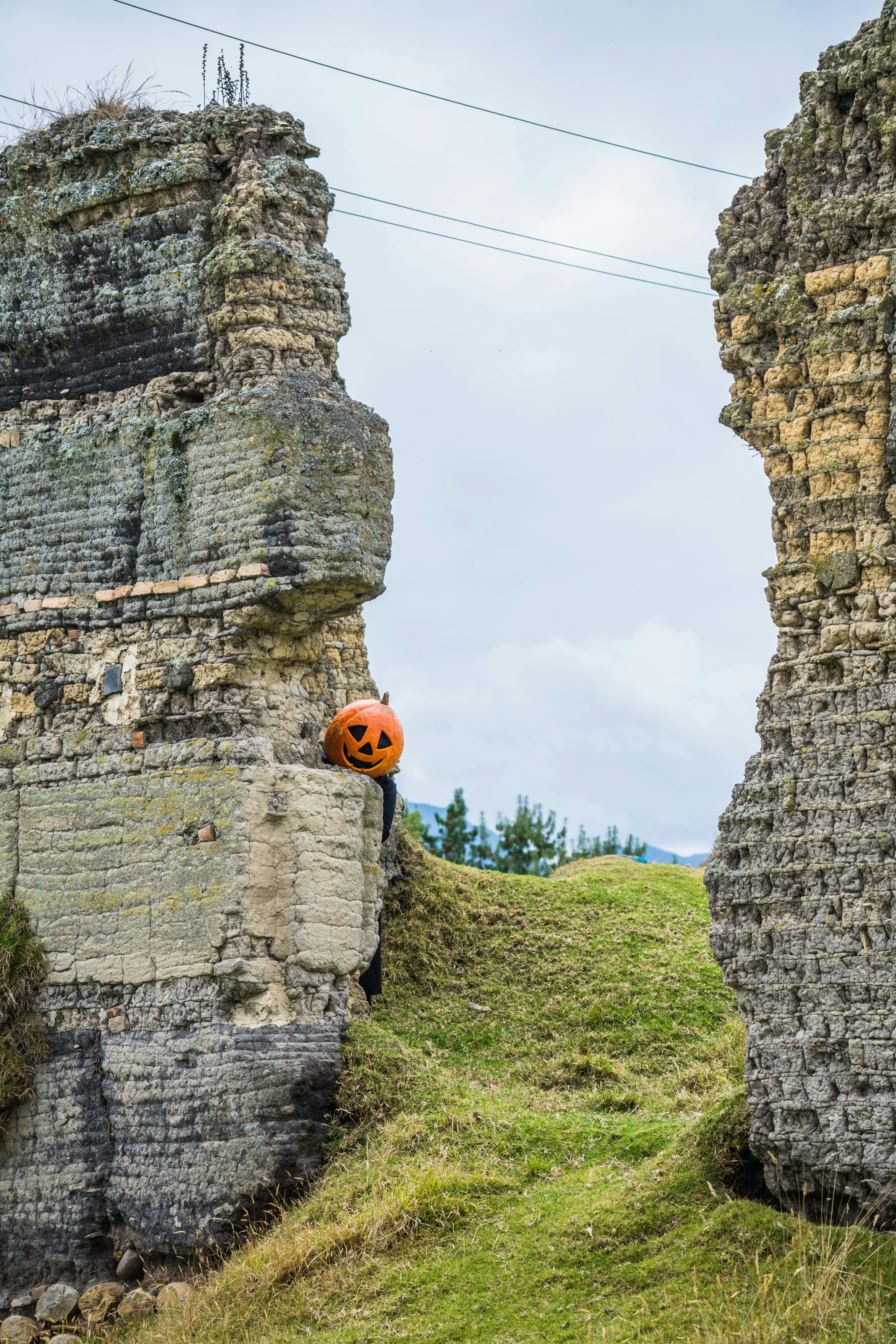 Mysterious Halloween Pumpkin in Guasca Ruins · Free Stock Photo