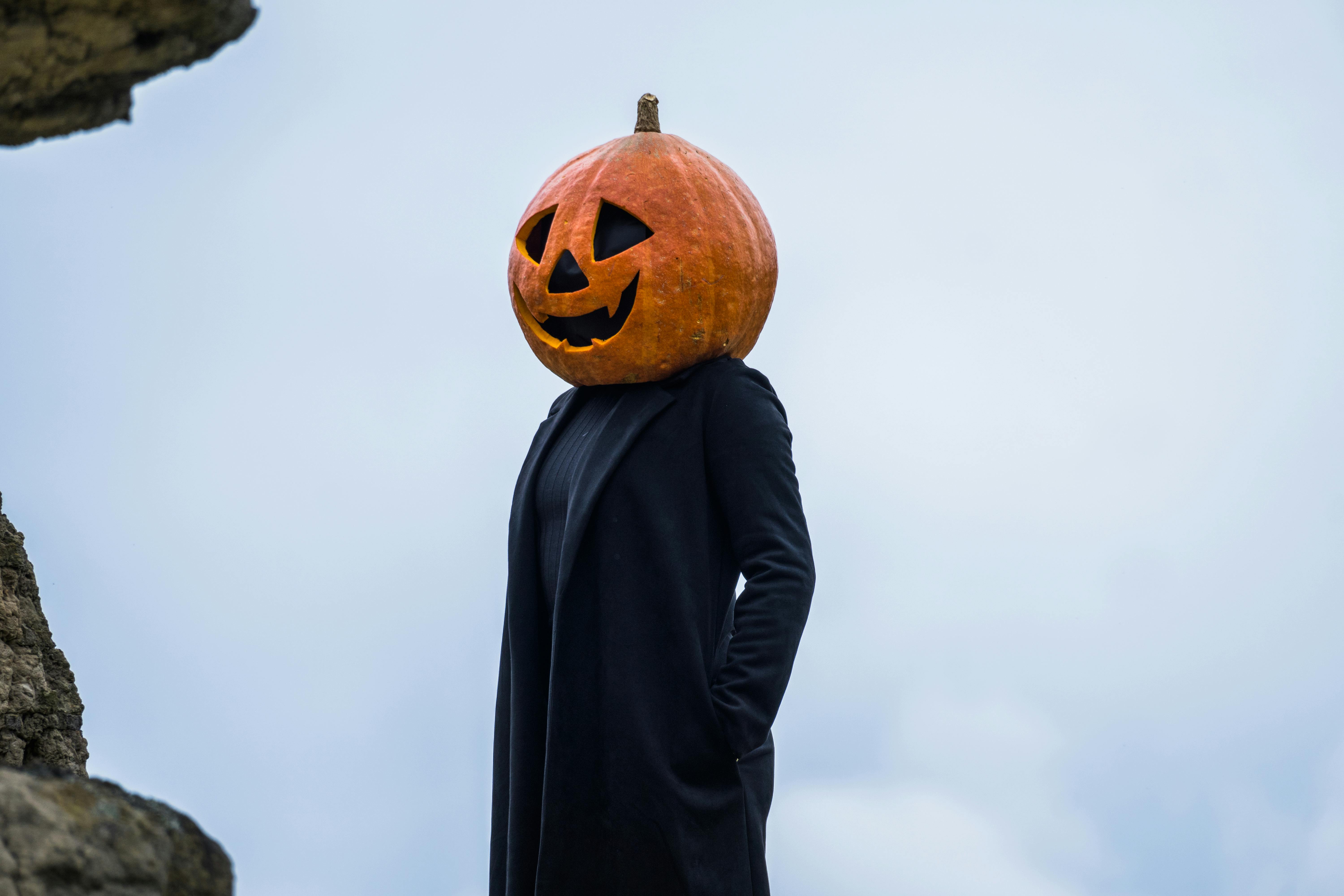 Dark Halloween Pumpkin Head Costume Outdoors · Free Stock Photo