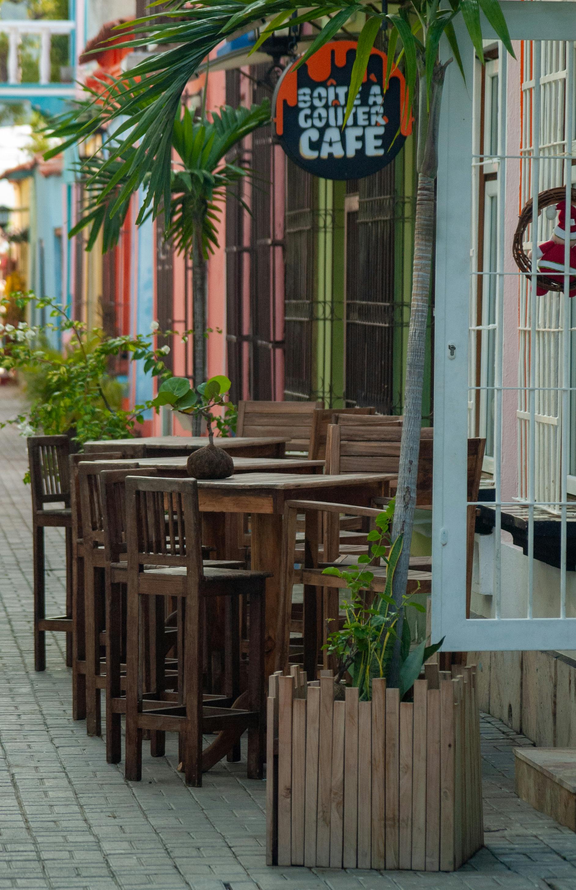 Cozy Outdoor Cafe Seating on City Street · Free Stock Photo