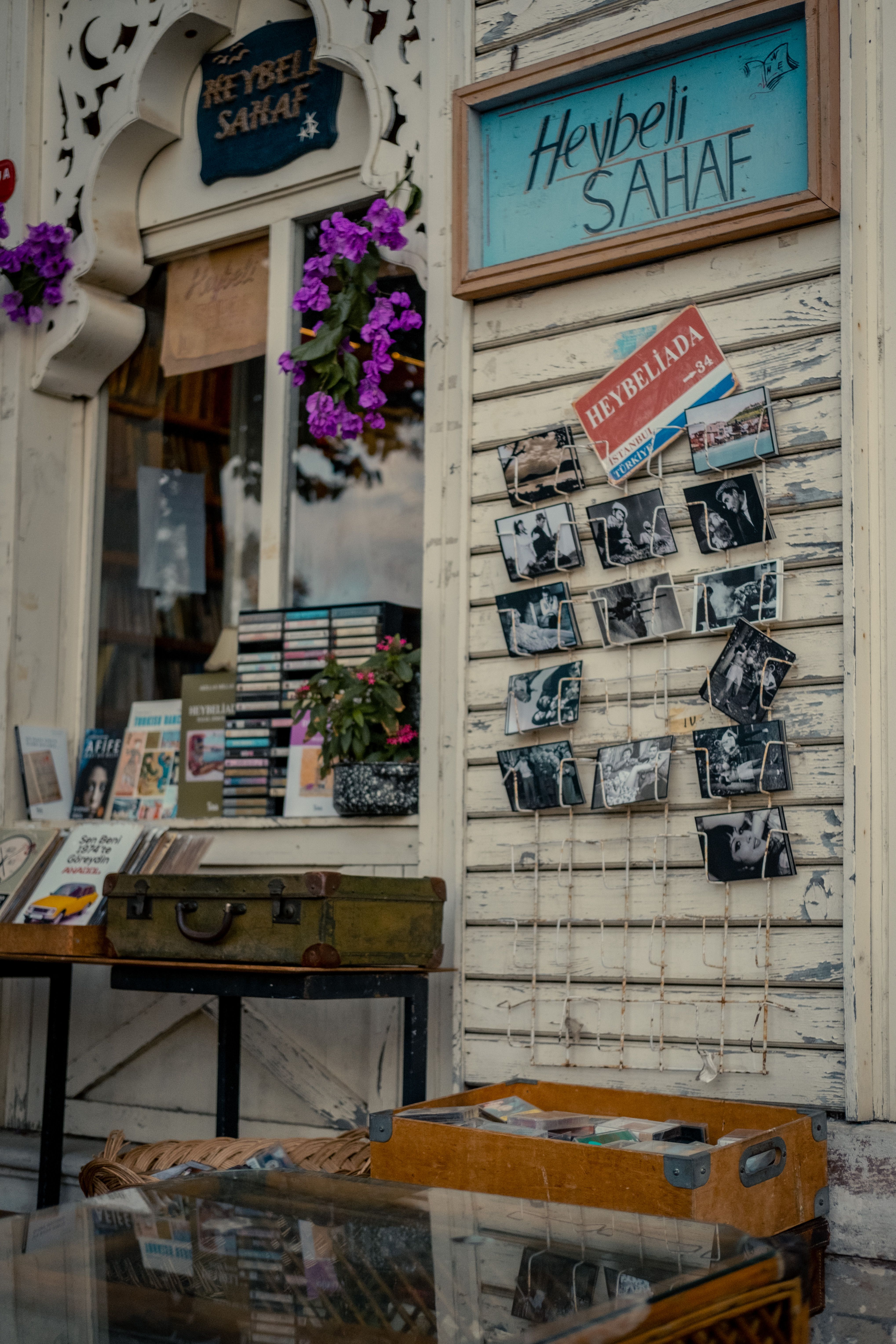 Vintage Bookstore Facade with Old Photographs · Free Stock Photo
