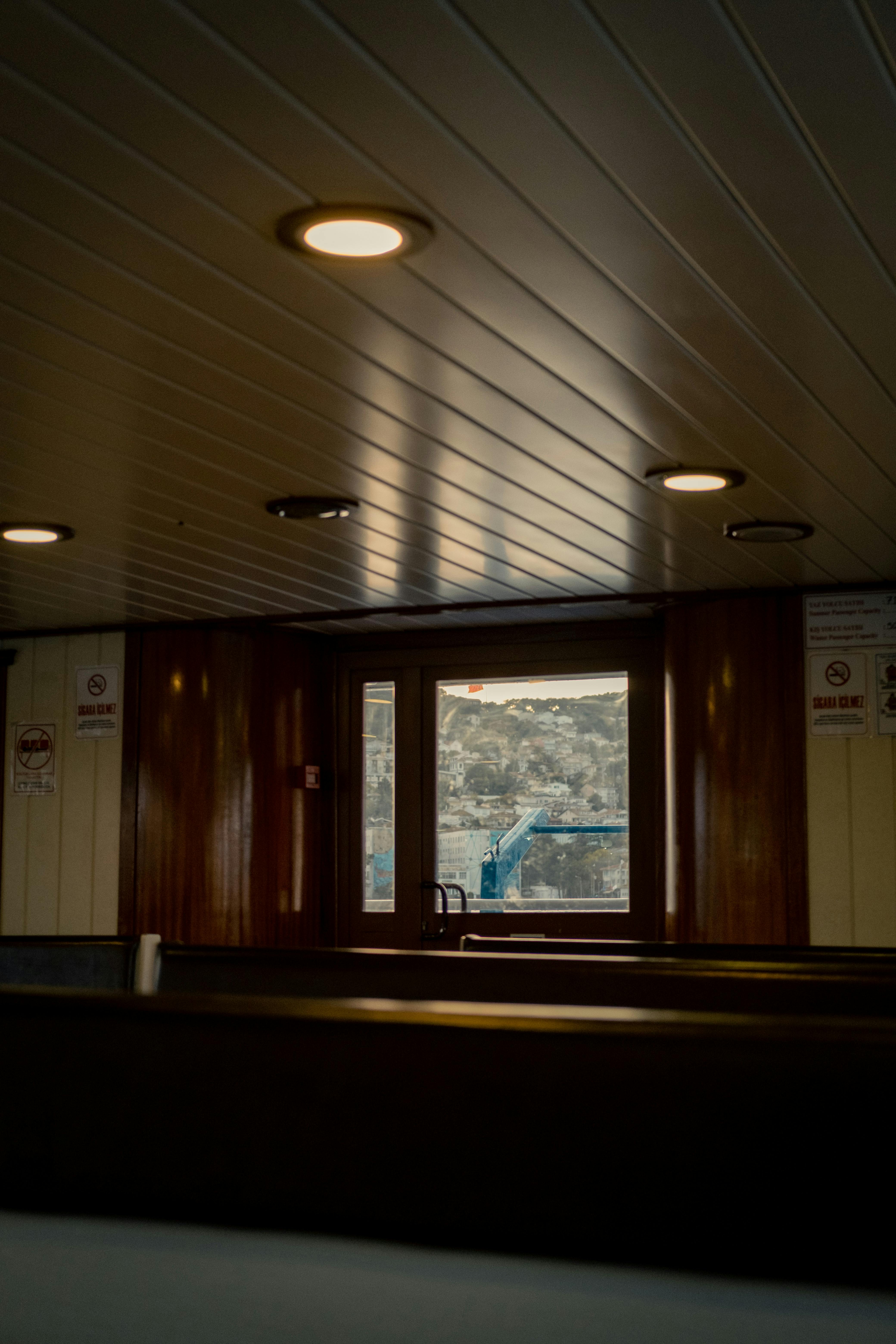 Interior of a Ship with Portside View through Window · Free Stock Photo