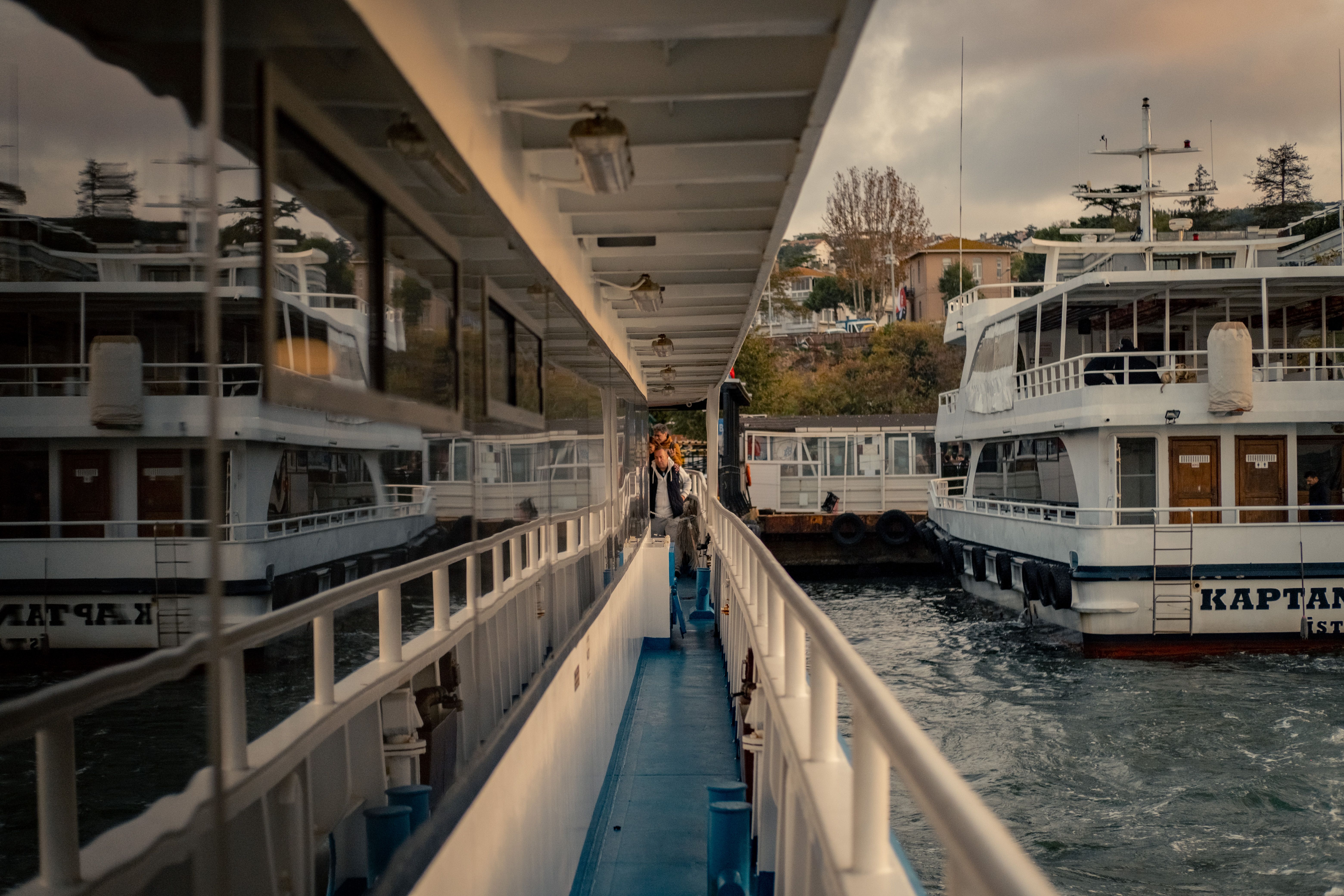Commuter Reflections on a Busy Ferry Ride · Free Stock Photo
