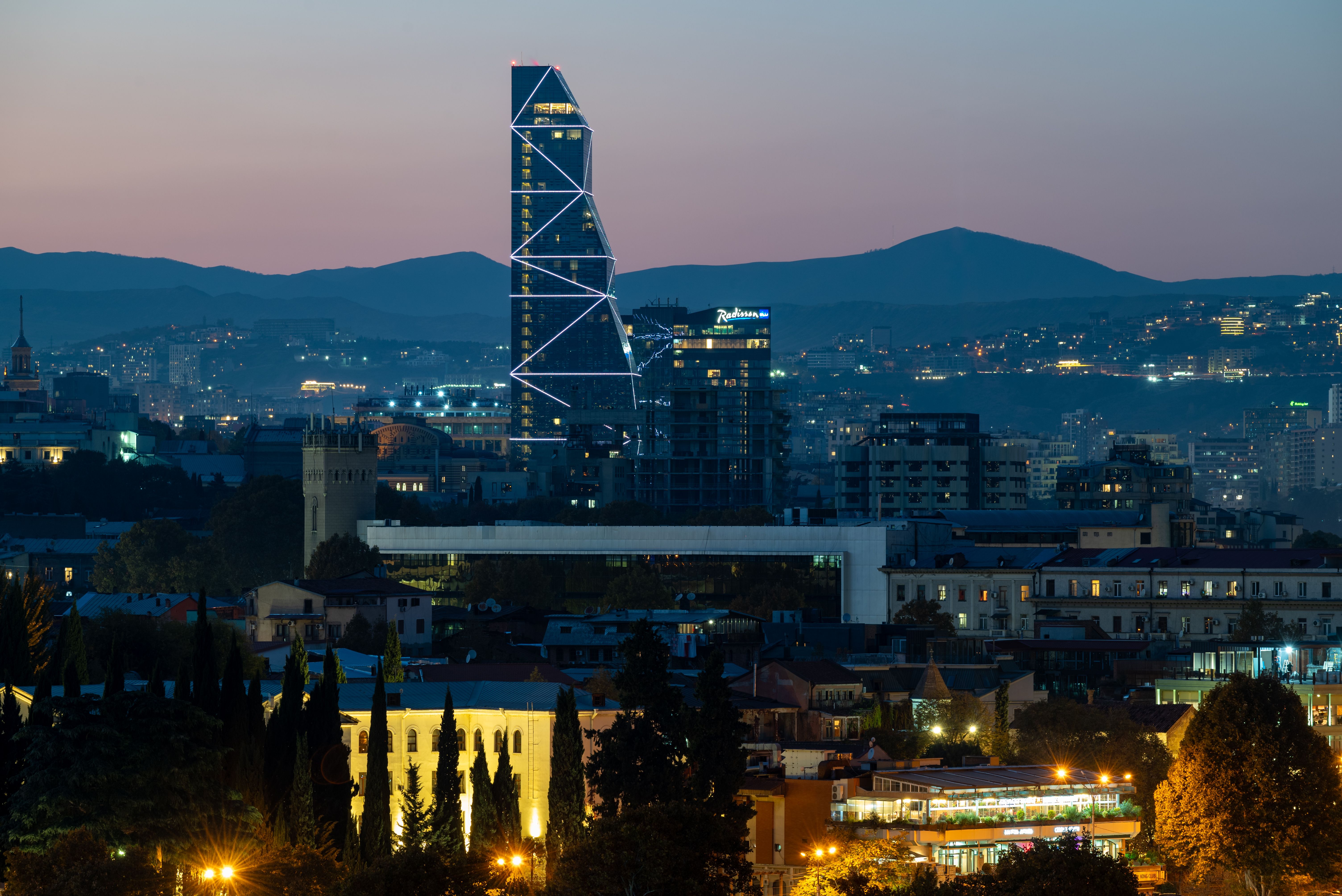 Skyline of Tbilisi with Iconic Tower at Twilight · Free Stock Photo