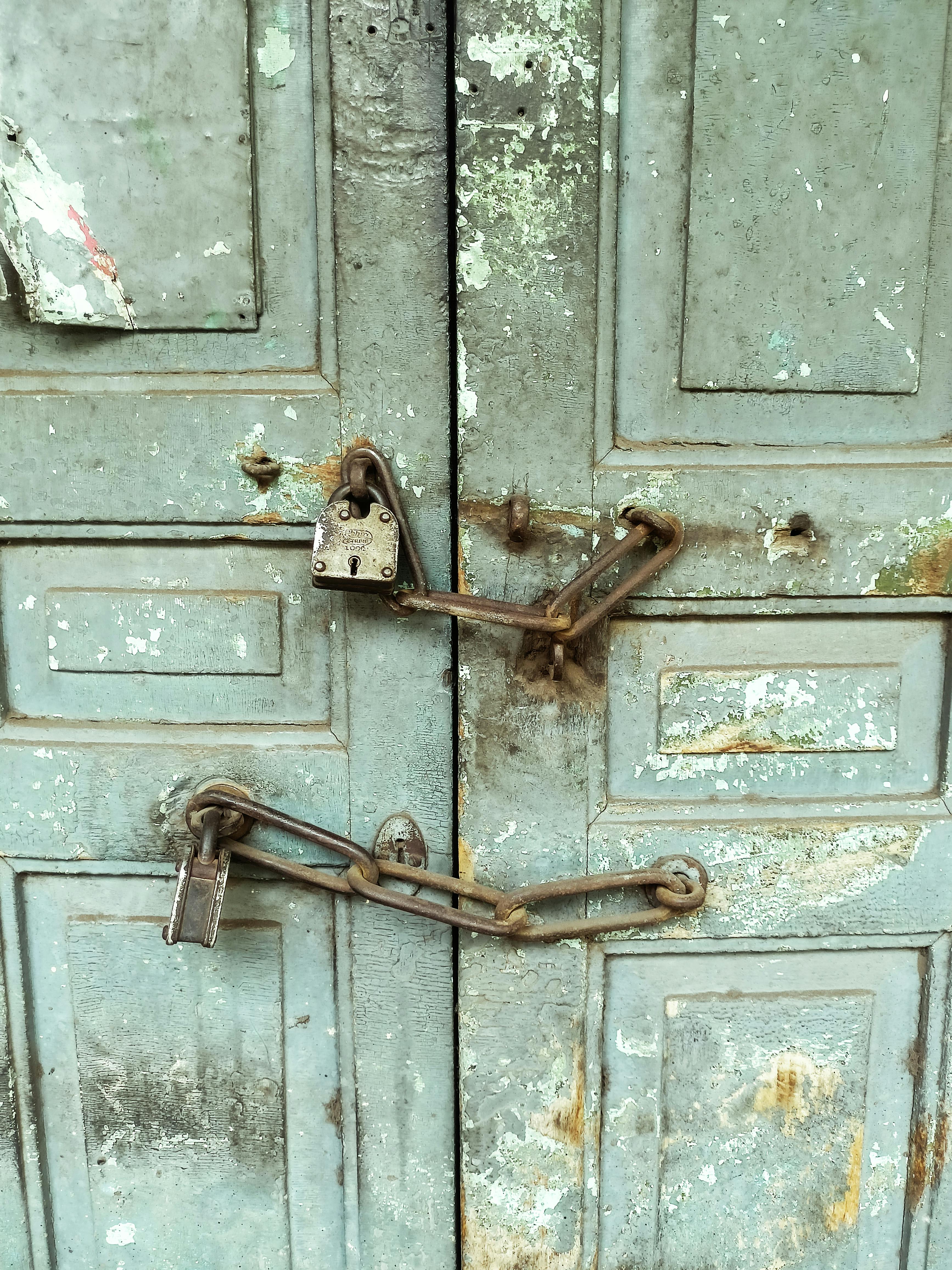 Rusted Metal Door with Padlocks and Chains · Free Stock Photo
