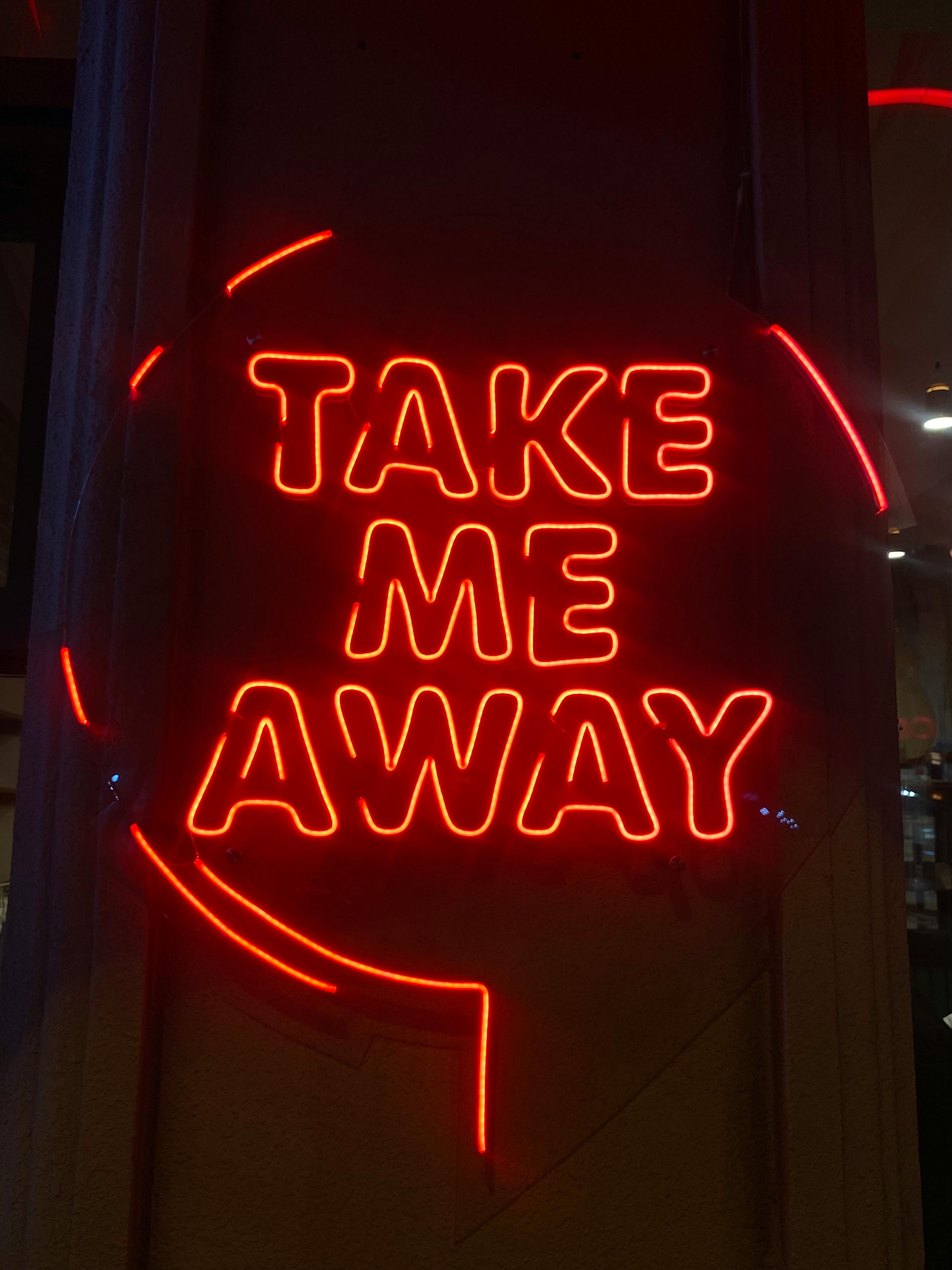 Neon Sign 'Take Me Away' Glowing at Night · Free Stock Photo