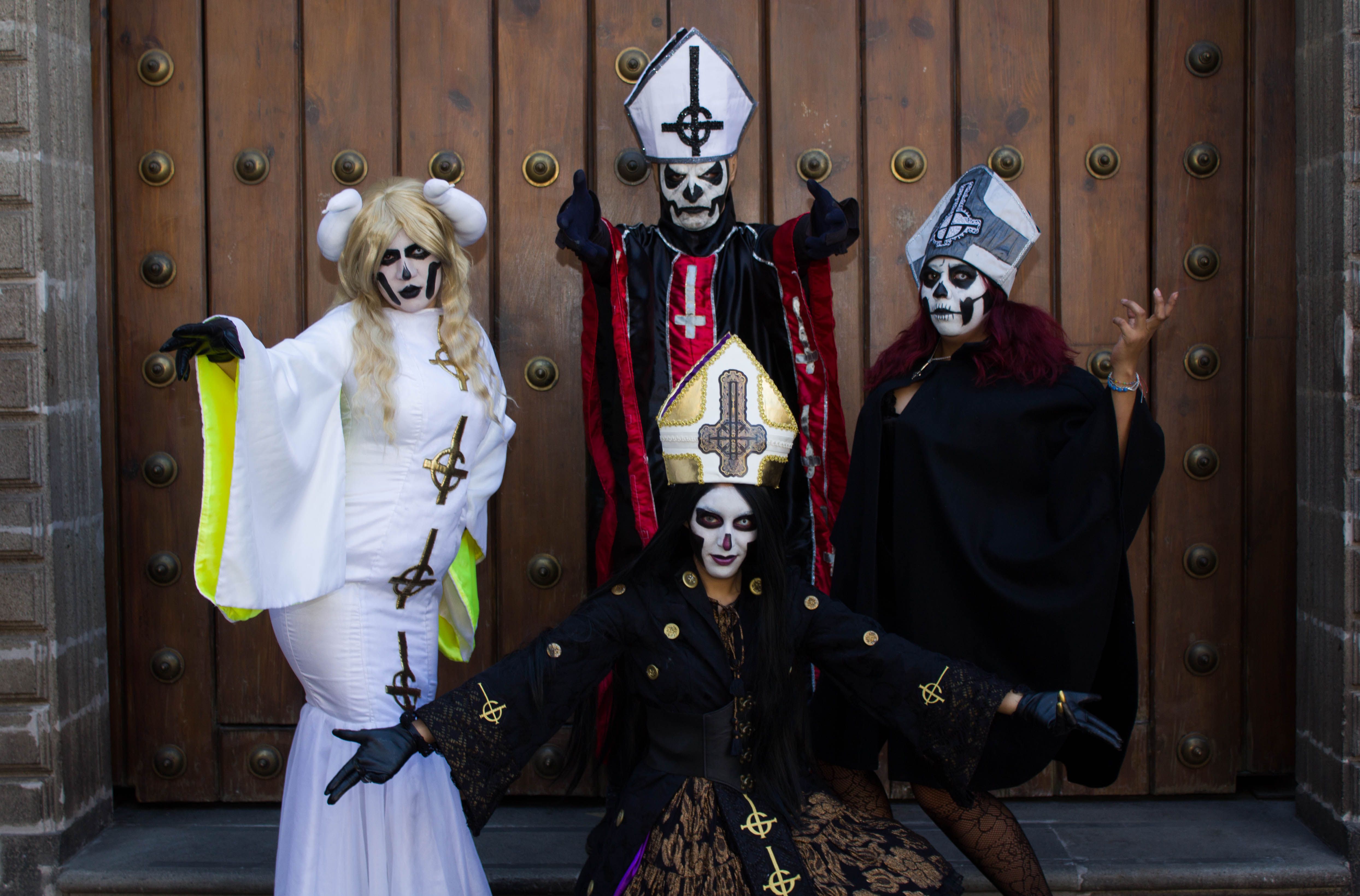 Group in Gothic Costume with Skull Makeup · Free Stock Photo