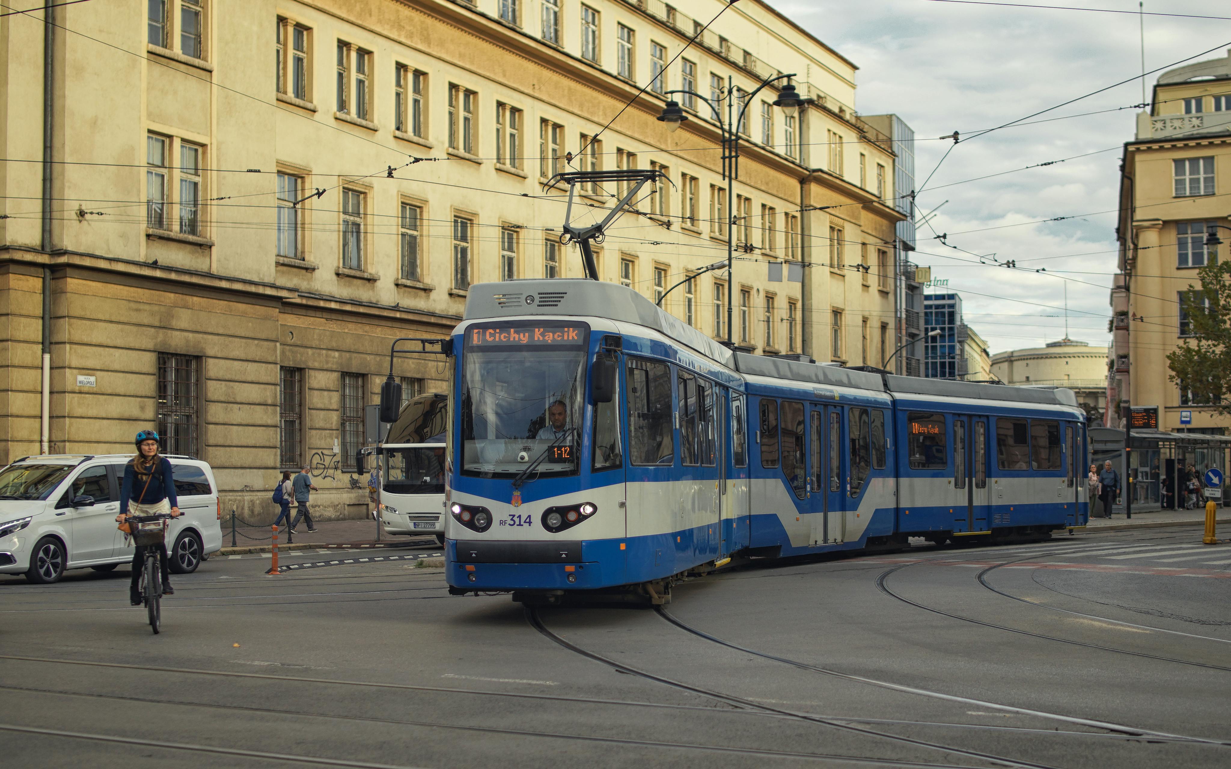 Tram in Historic Kraków Street Scene · Free Stock Photo