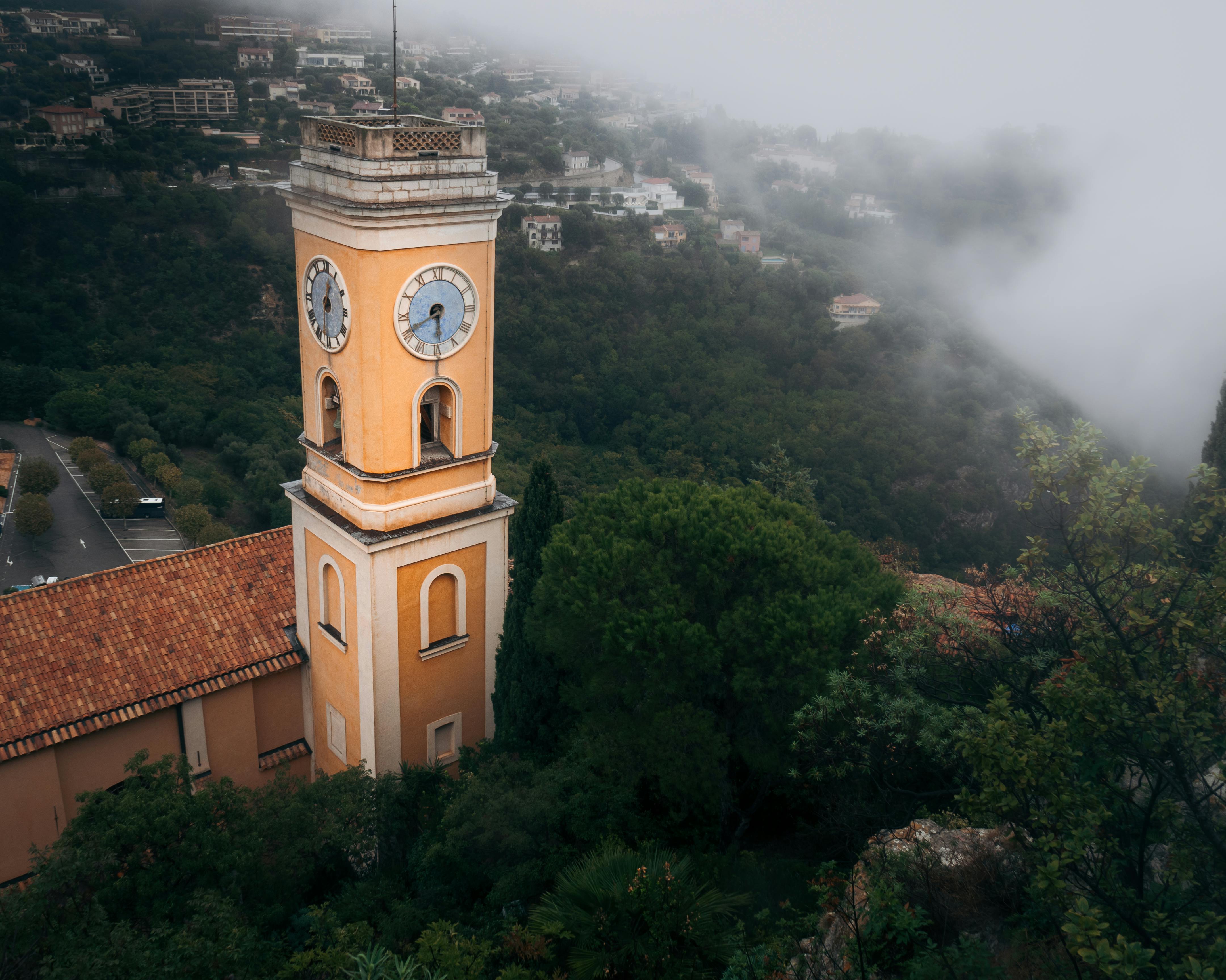 Charming Èze Church Tower in Misty Atmosphere · Free Stock Photo