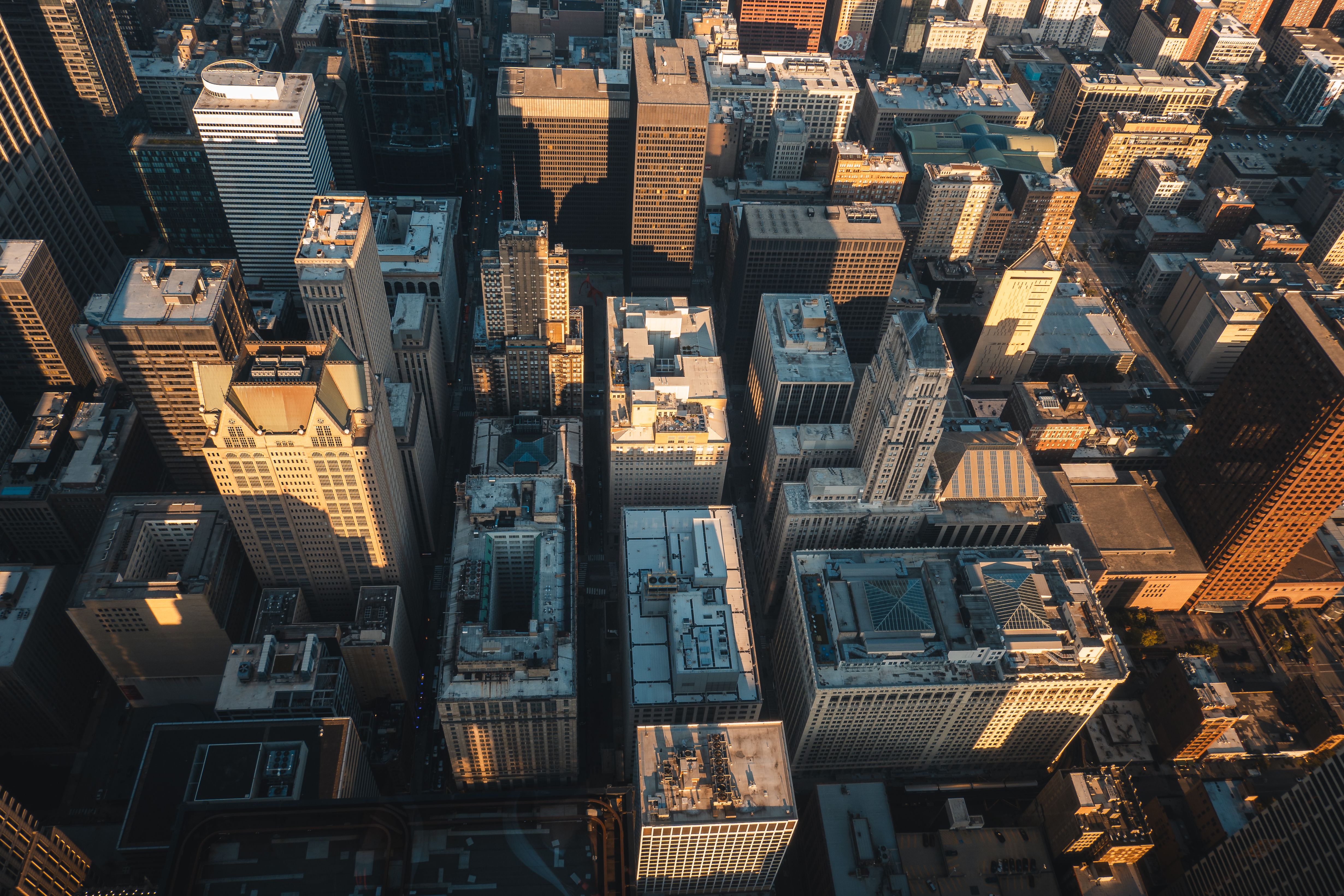 Aerial View of Sunlit Urban Skyline at Daytime · Free Stock Photo