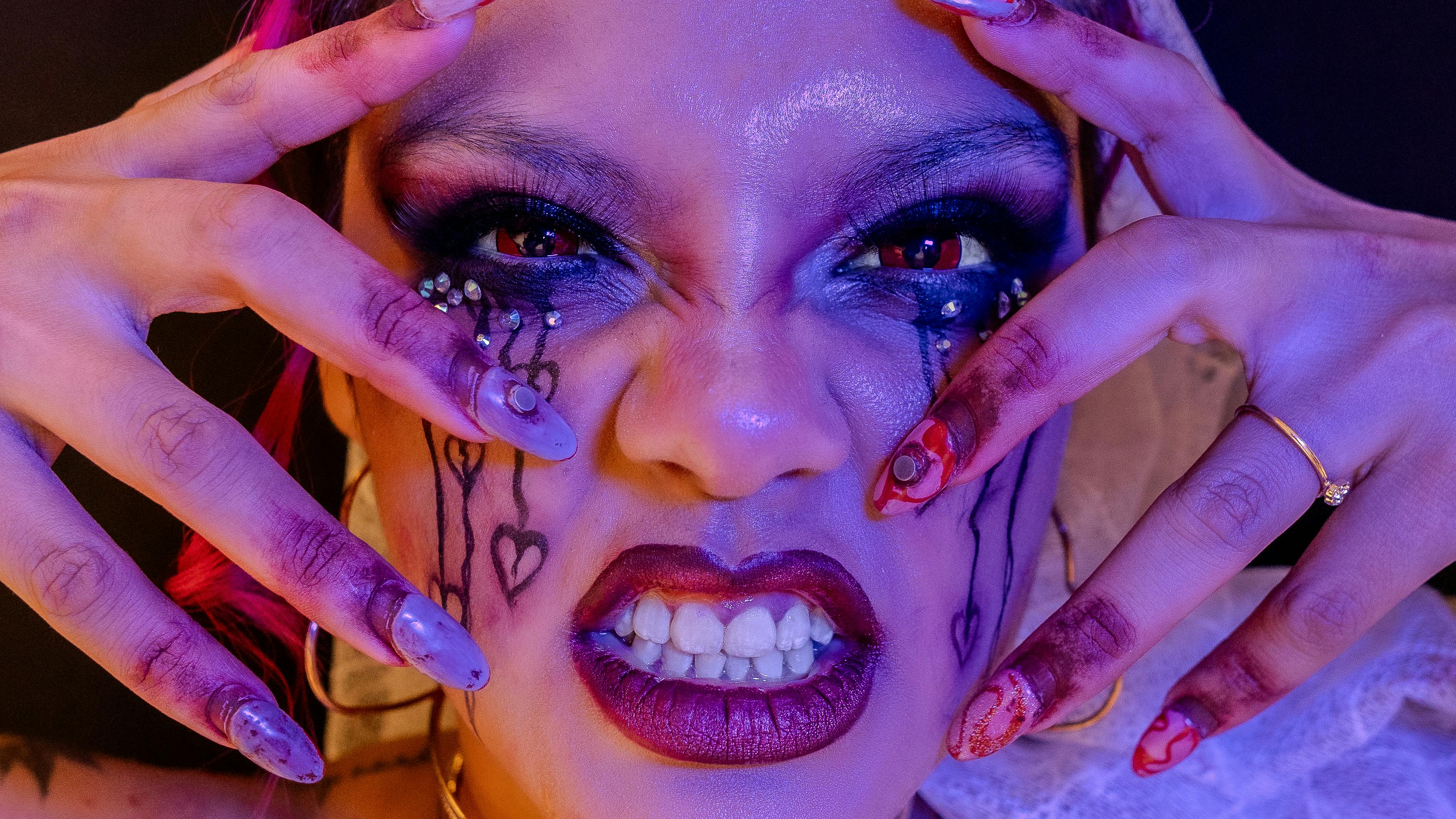 Surreal Gothic Makeup with Dramatic Expression · Free Stock Photo