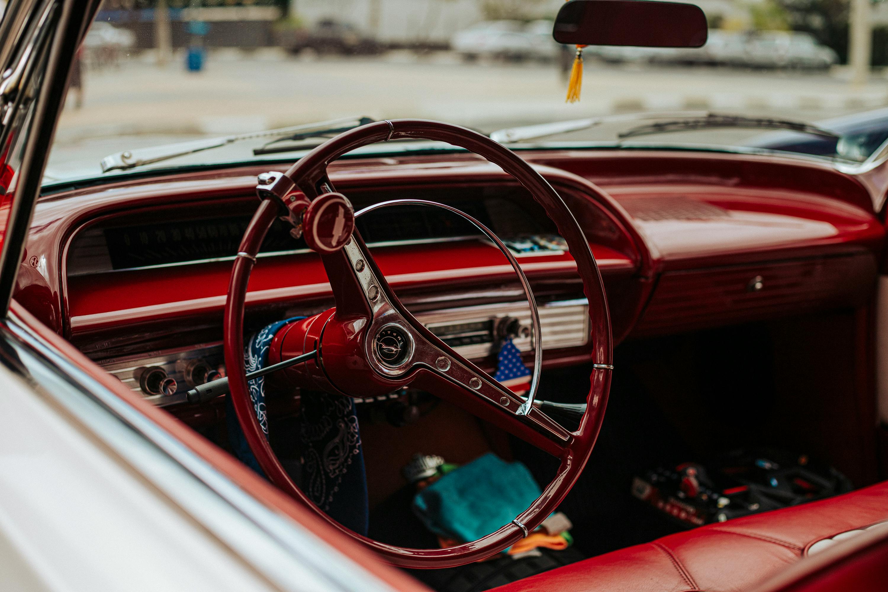 Vintage Car Interior with Classic Red Dashboard · Free Stock Photo