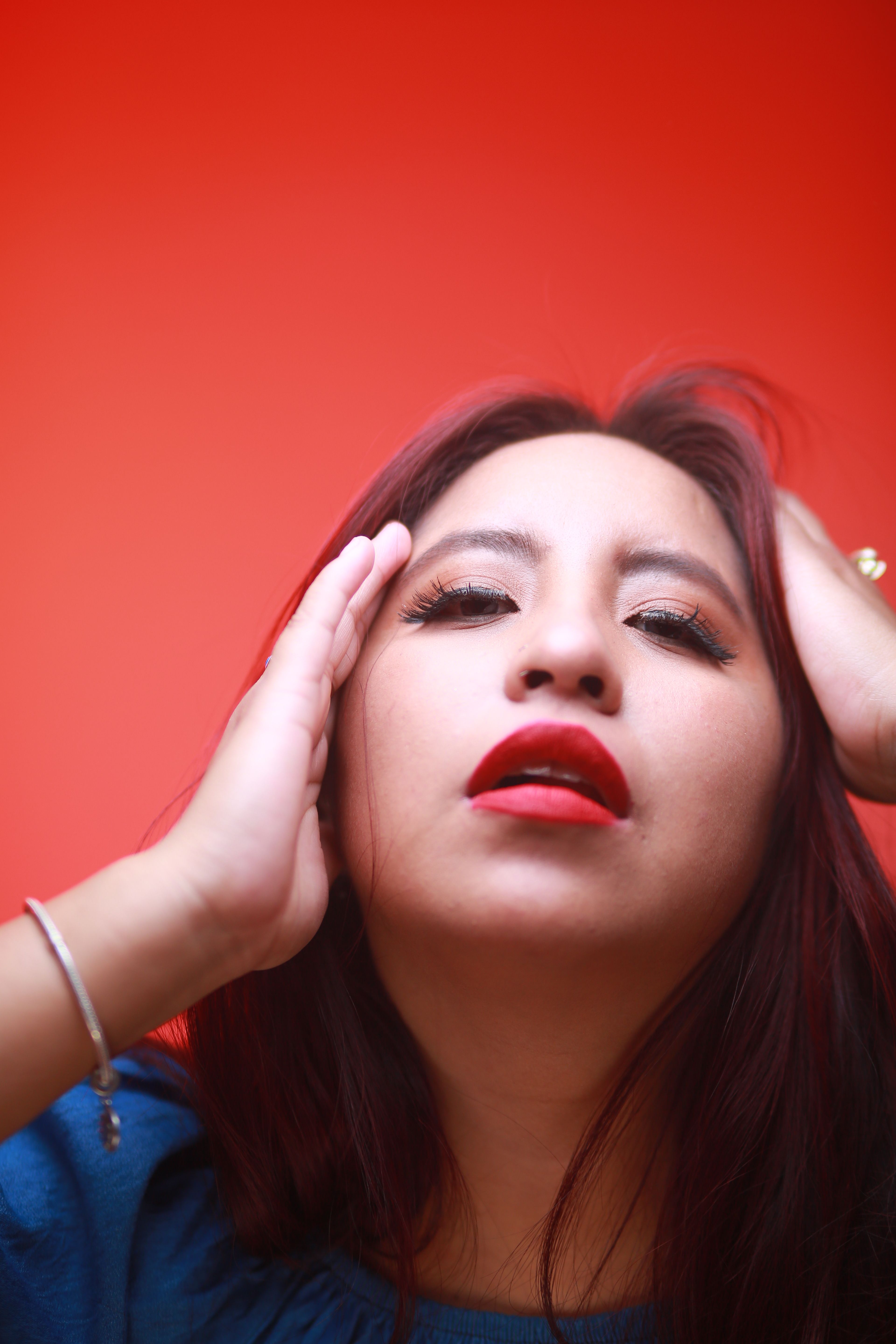 Woman Expressing Emotion in Studio Portrait · Free Stock Photo