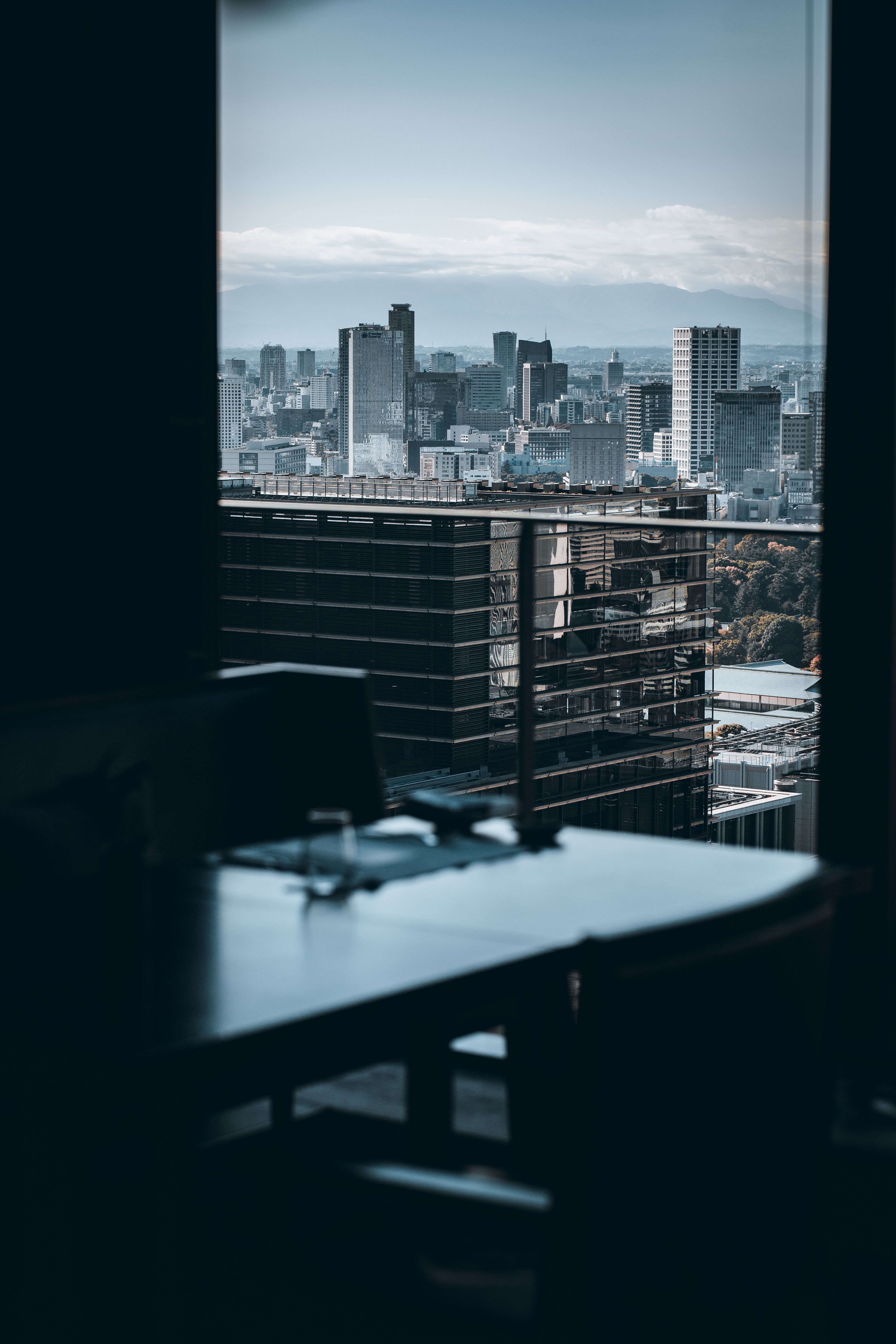 Scenic View of Tokyo Skyline through Window · Free Stock Photo